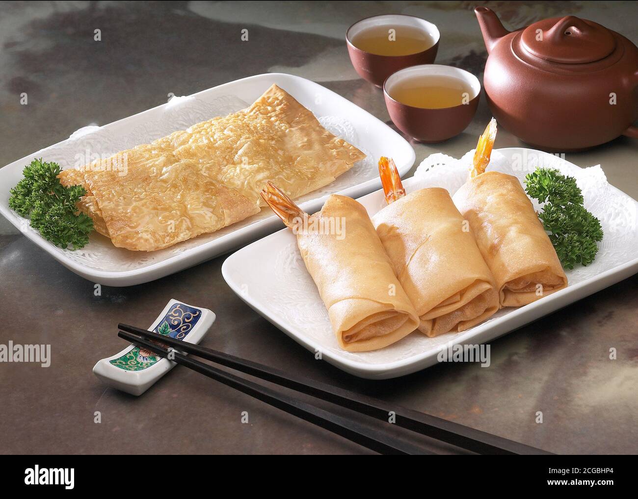 Dim sum with fried spring rolls and soybean skin Stock Photo - Alamy