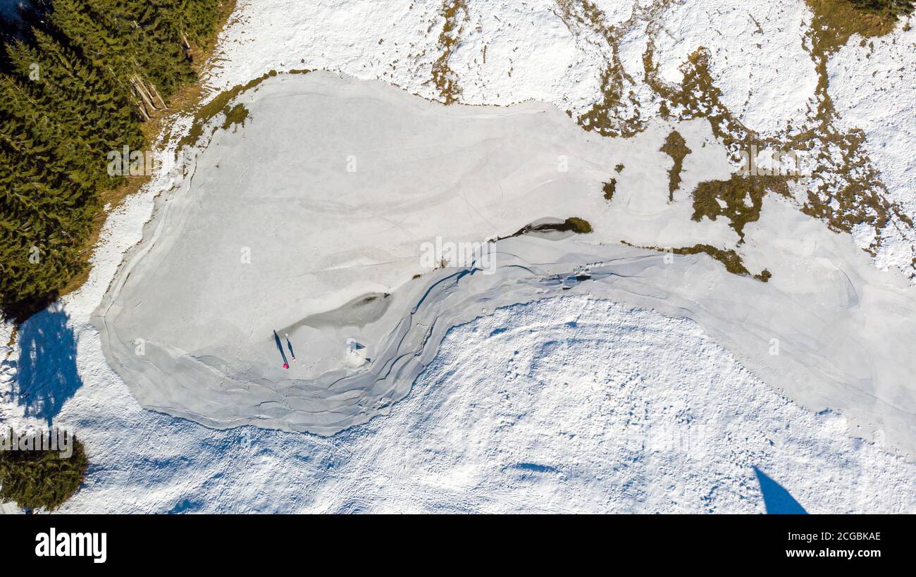 Aerial drop down view of frozen lake Stock Photo - Alamy