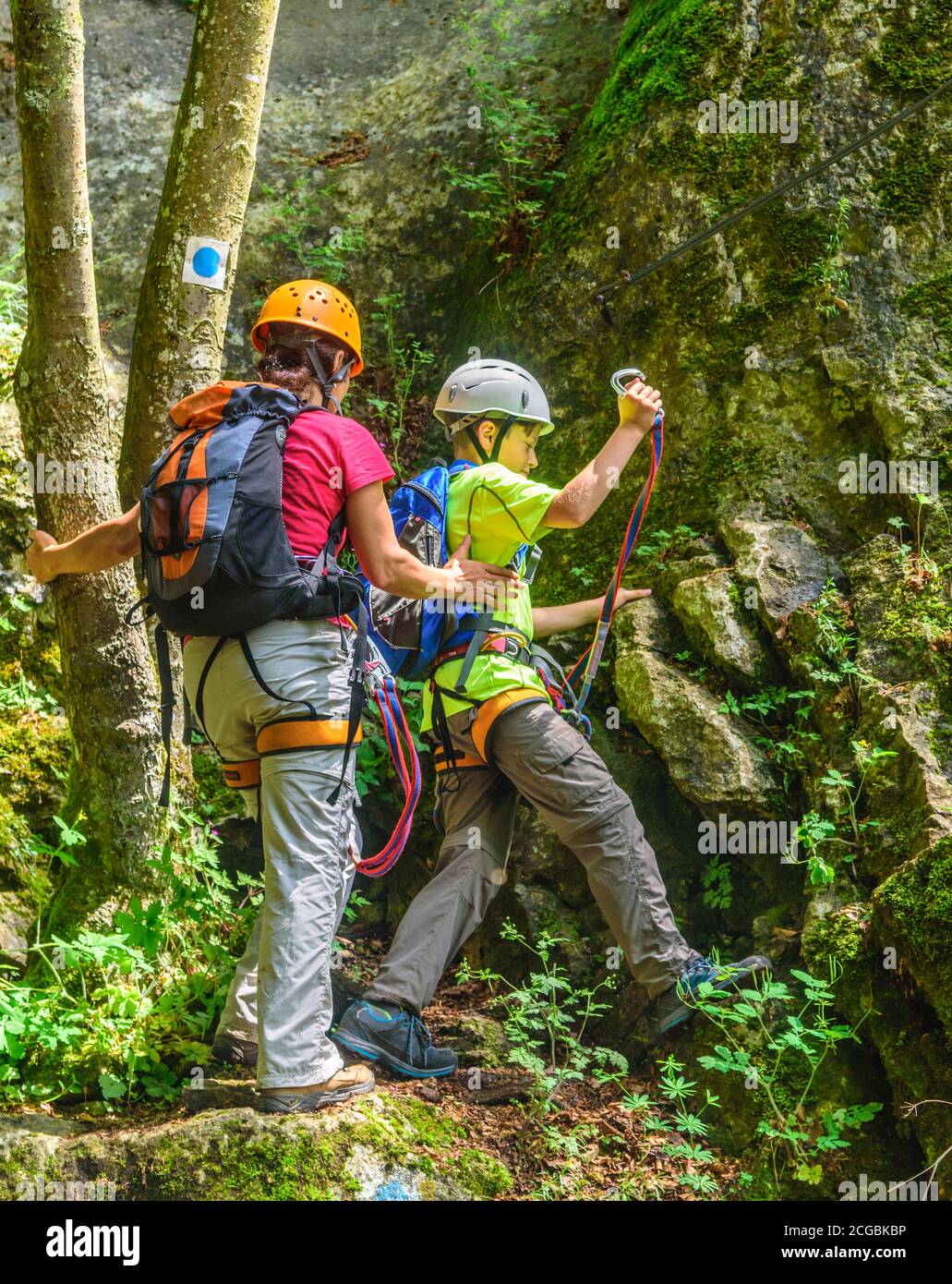 A group of young people doing adventure hike in nature park Altmühltal ...