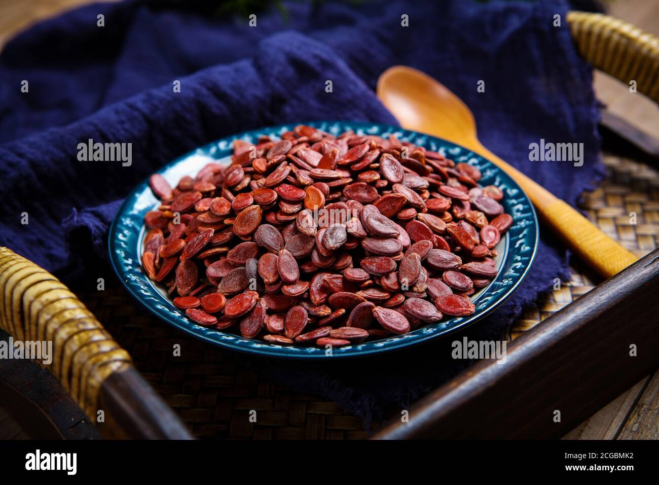 Red melon seeds Stock Photo - Alamy