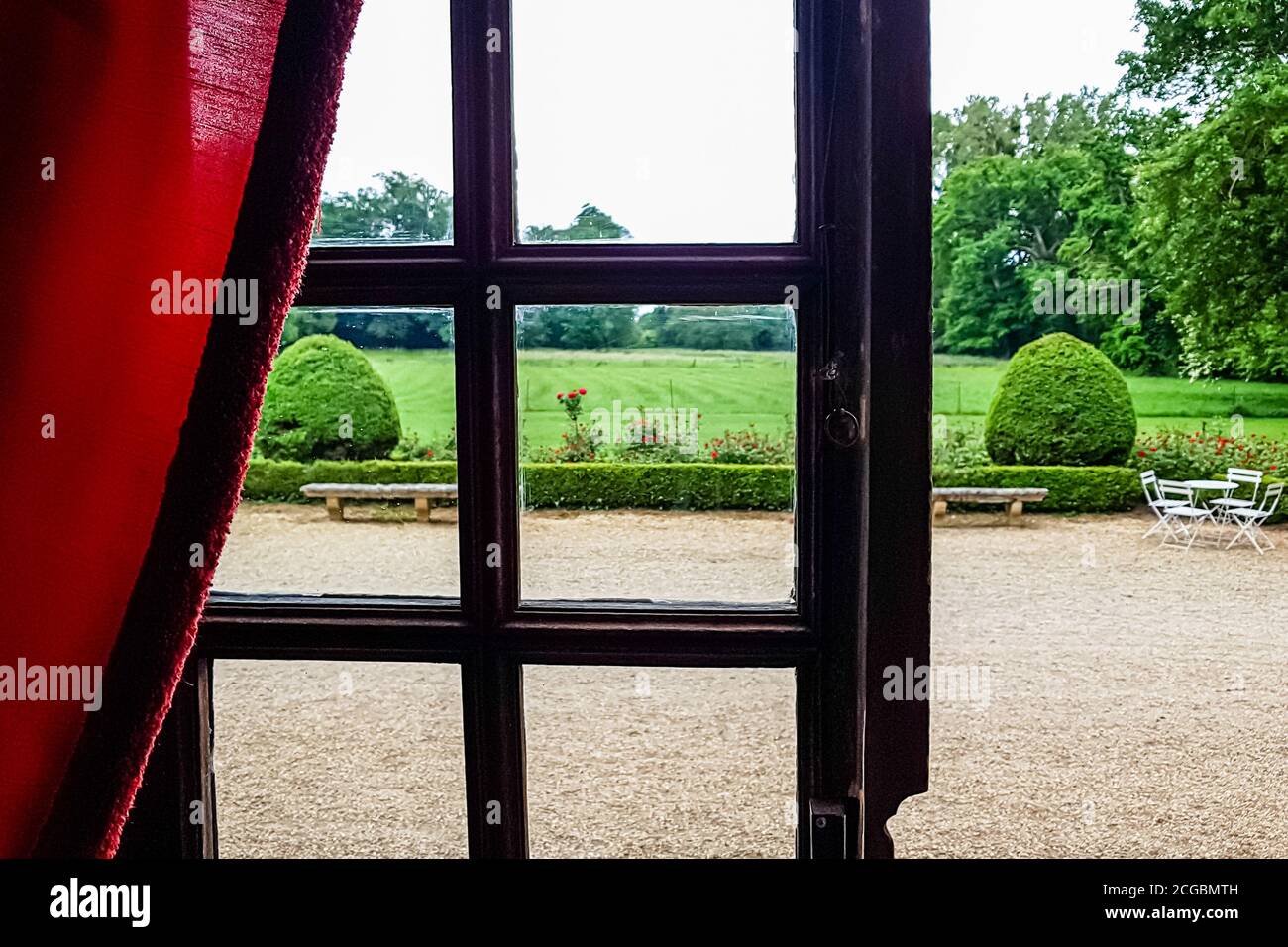 View of the regular Park through a window with bars. Summer Stock Photo ...