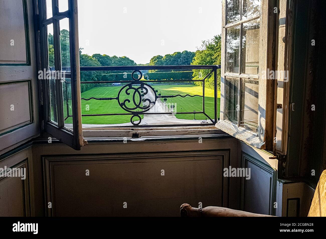 View of the regular Park through a window with bars. Summer Stock Photo ...
