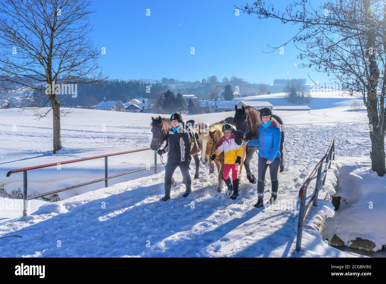 Three women horse riding on hi-res stock photography and images - Alamy