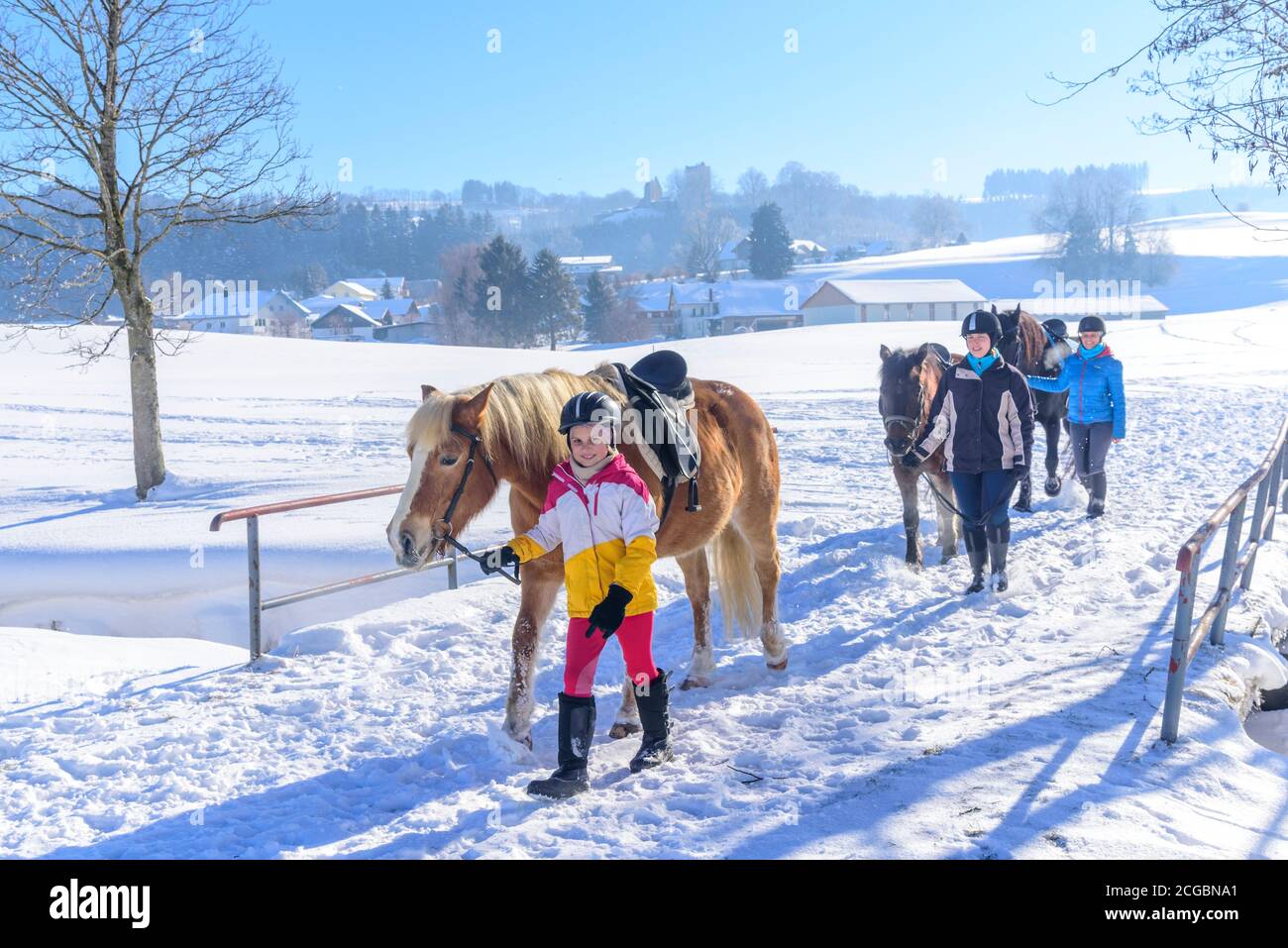Three women horse riding on hi-res stock photography and images - Alamy