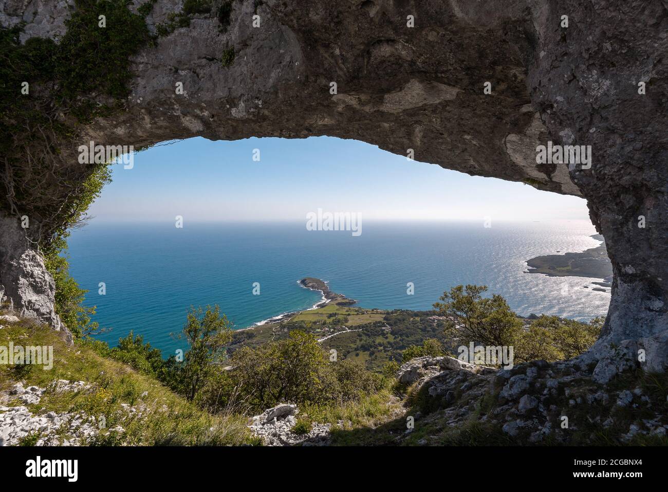 Natural arch called Ojo del Diablo (Eye of the Devil) in Cantabria ...