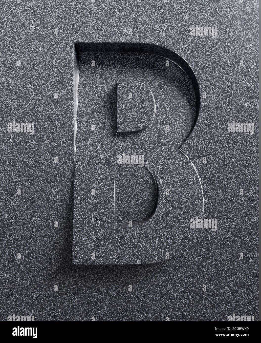 Slanted 3d font engraved and extruded from the surface, letter B Stock ...