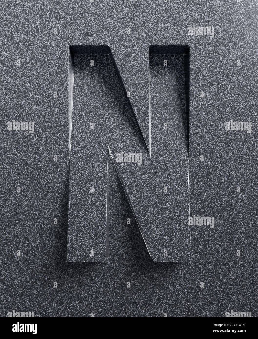 Slanted 3d font engraved and extruded from the surface, letter N Stock ...