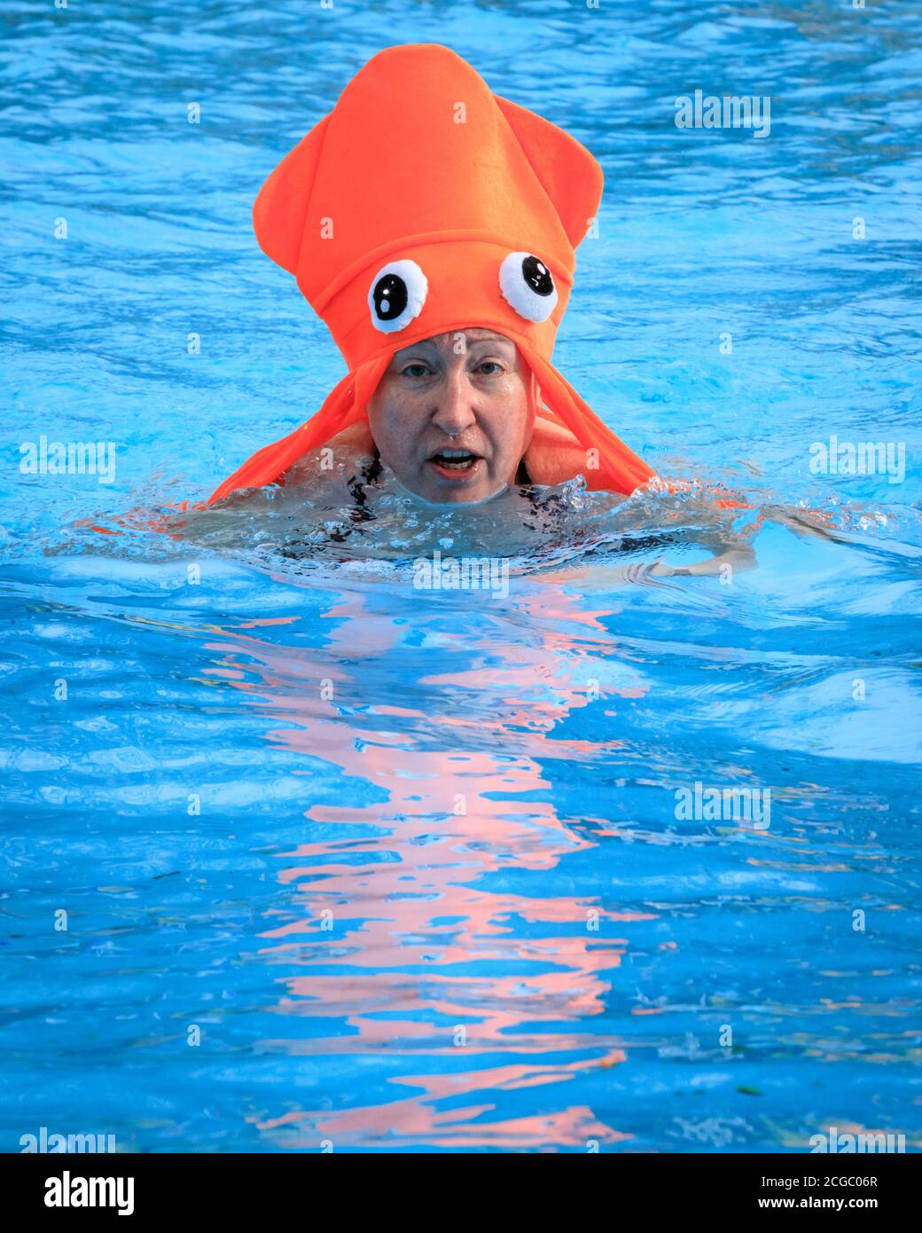 Funny woman in swimming costume hi-res stock photography and images - Alamy