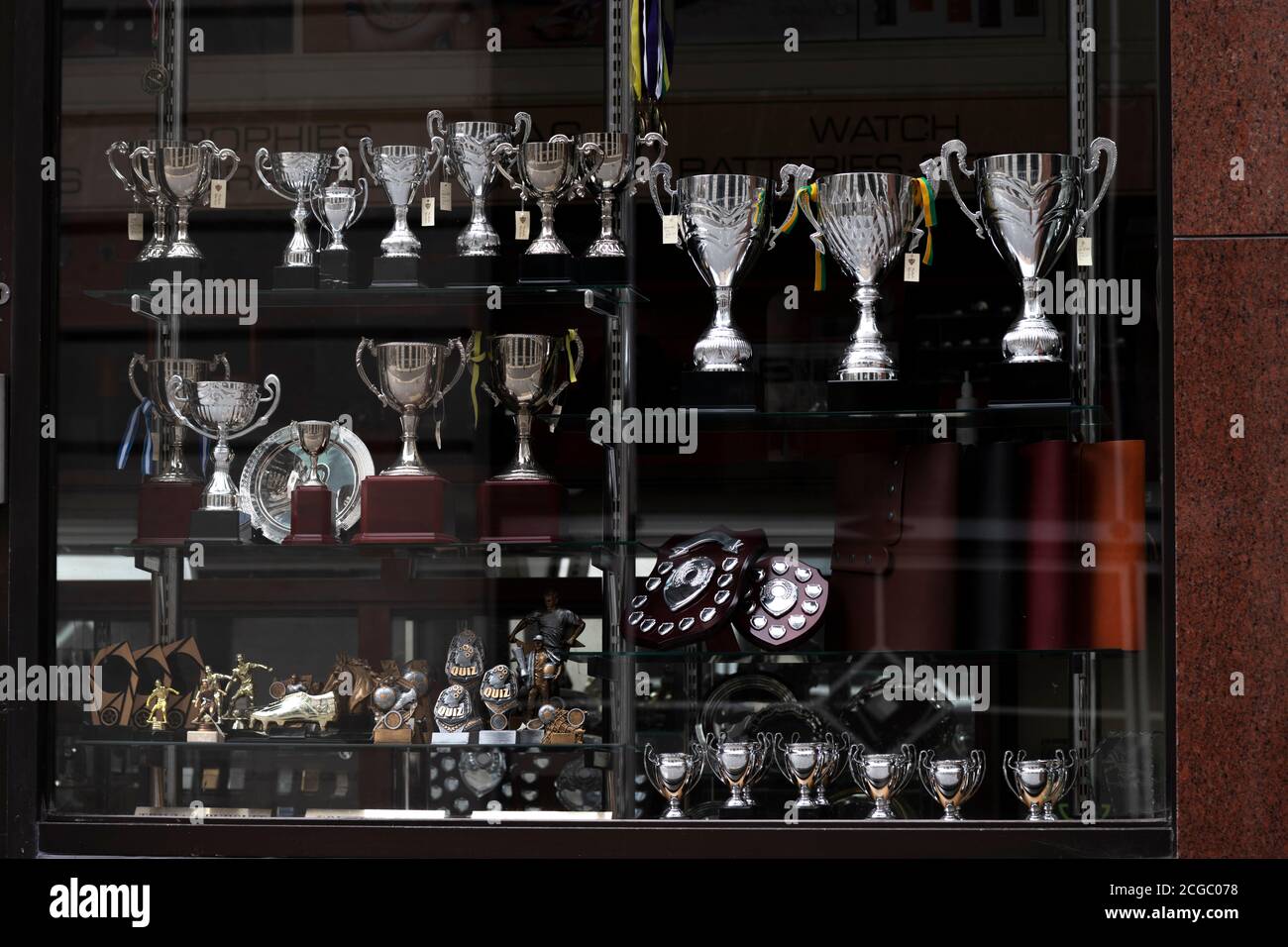 Trophies in a shop window Stock Photo - Alamy
