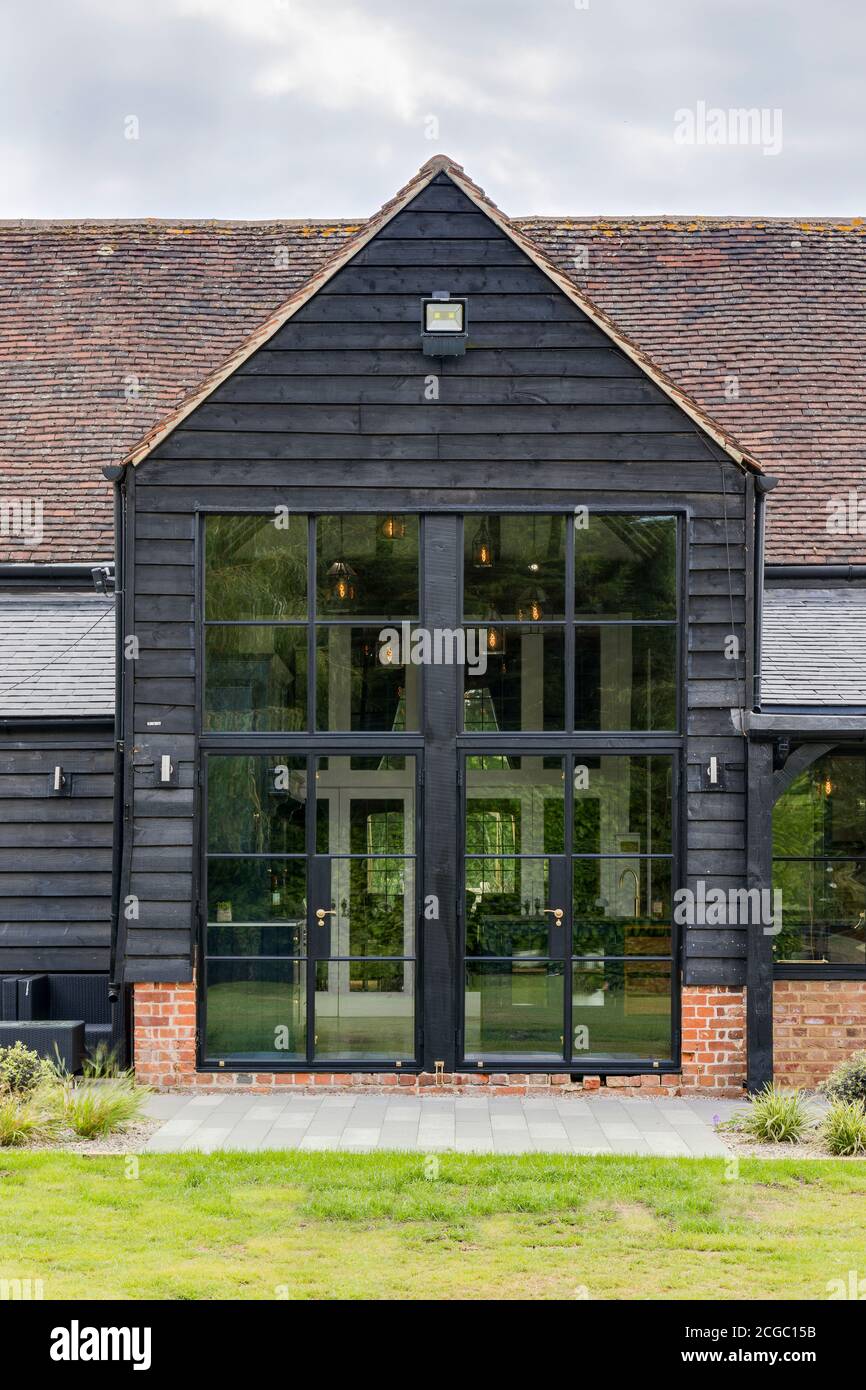 Exterior view of a converted barn/mill in Essex, UK, featuring beautful ...