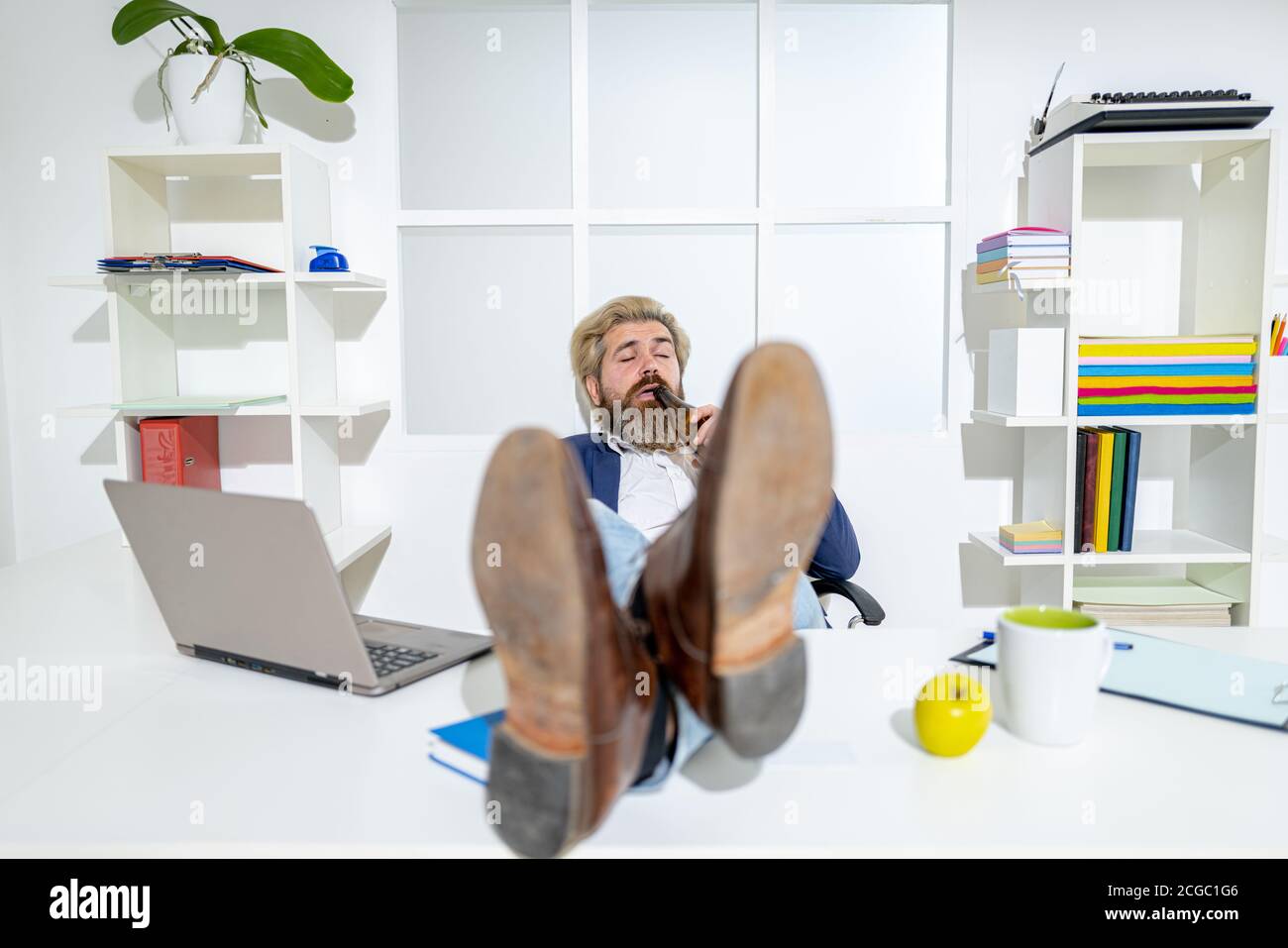 Business man employee drinking in the office at desk. Drunk young ...
