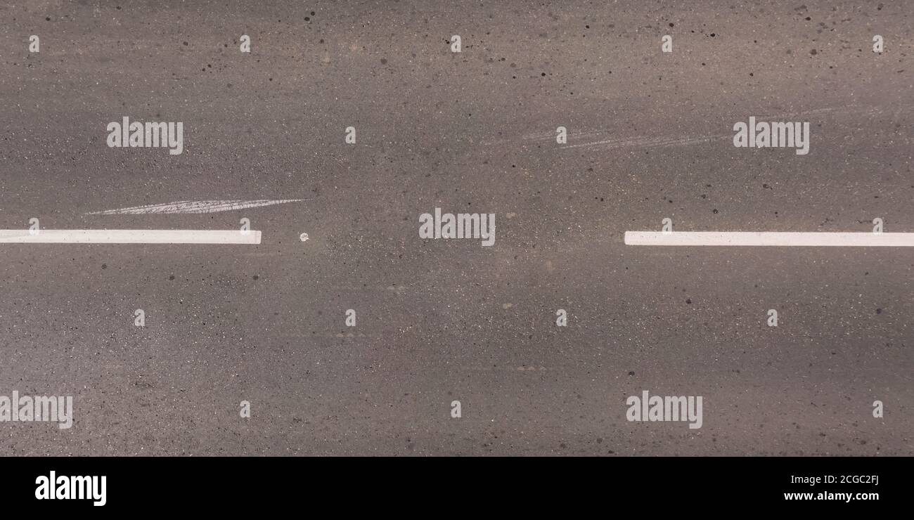 view from above on texture of old asphalt road Stock Photo - Alamy