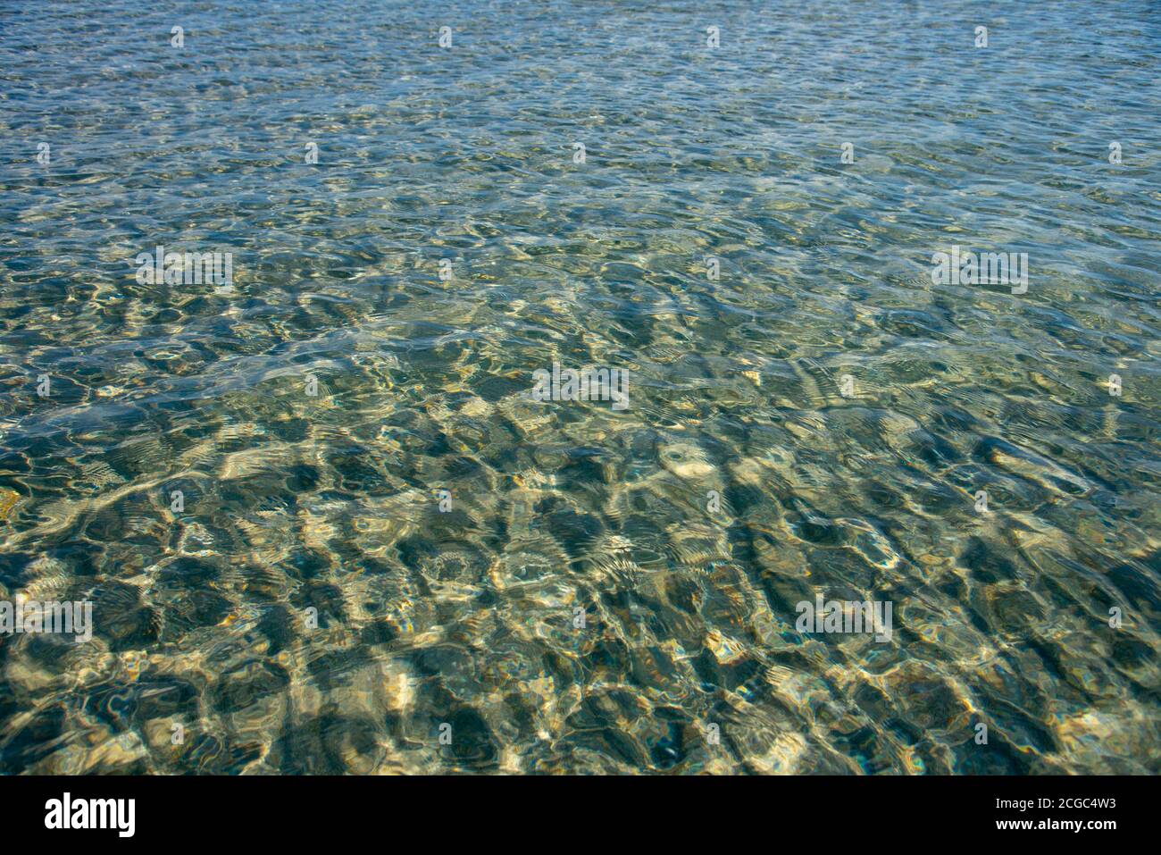 Full frame transparent sea water, illuminated by the sun Stock Photo ...