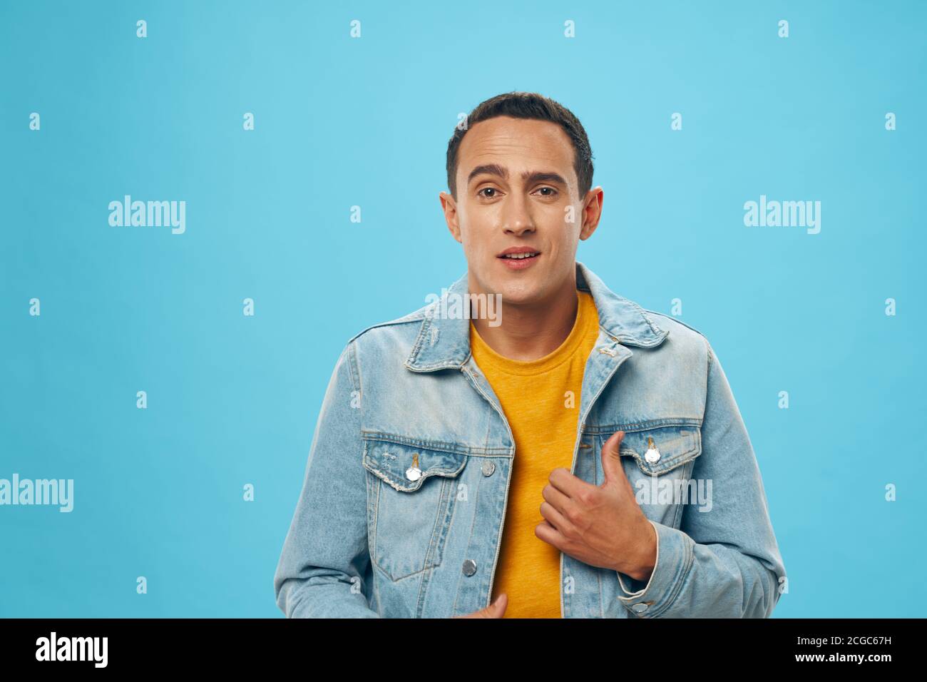 Man in shirt emotions cropped view blue background Stock Photo - Alamy
