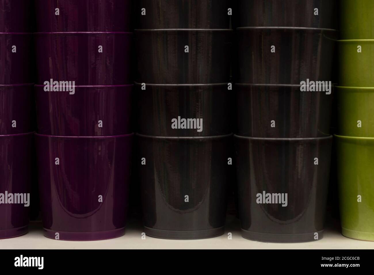 Rows of flower pots. On supermarket Stock Photo - Alamy