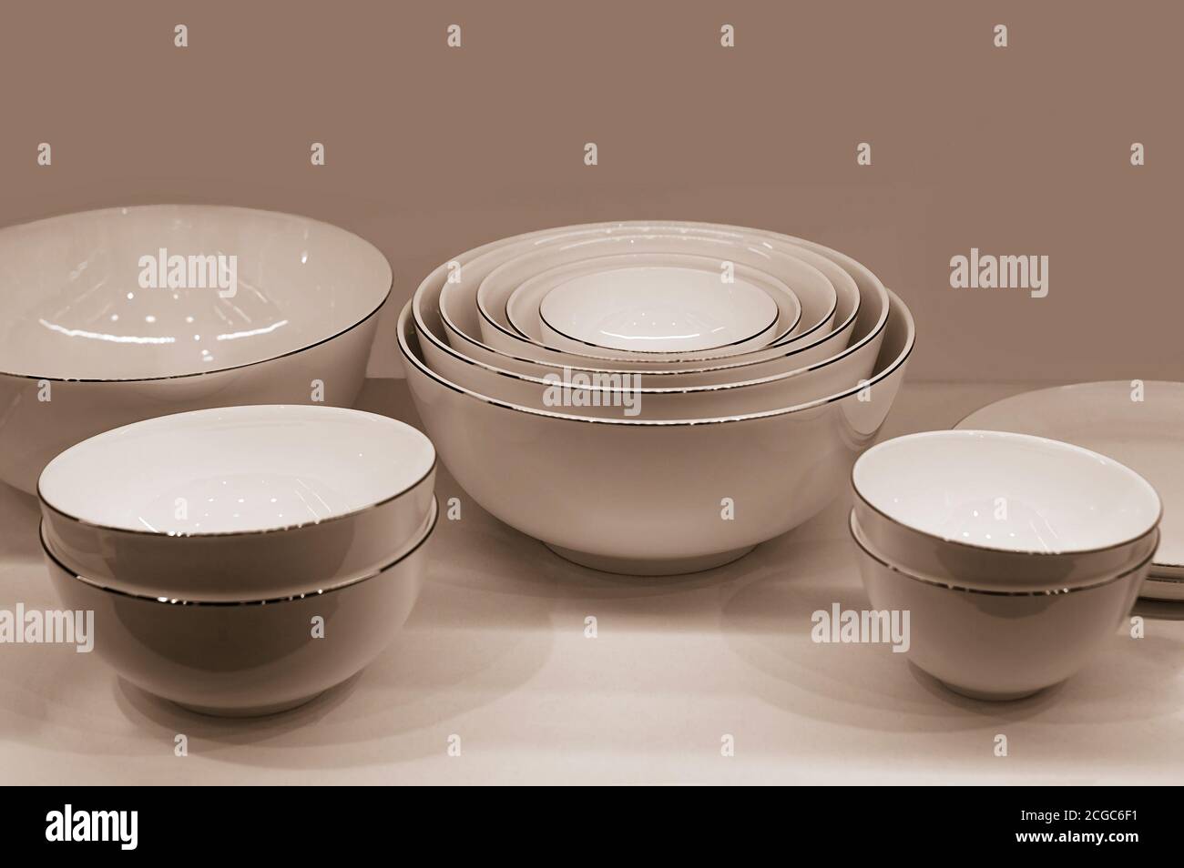 A set of white utensils. Front view Stock Photo - Alamy