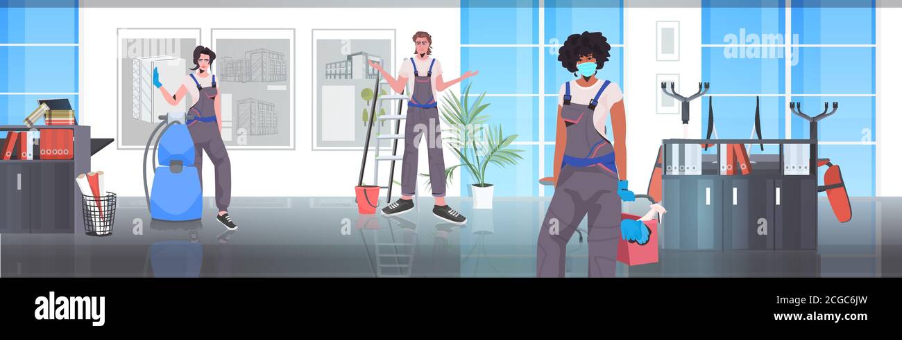 professional cleaners team mix race janitors with cleaning equipment ...