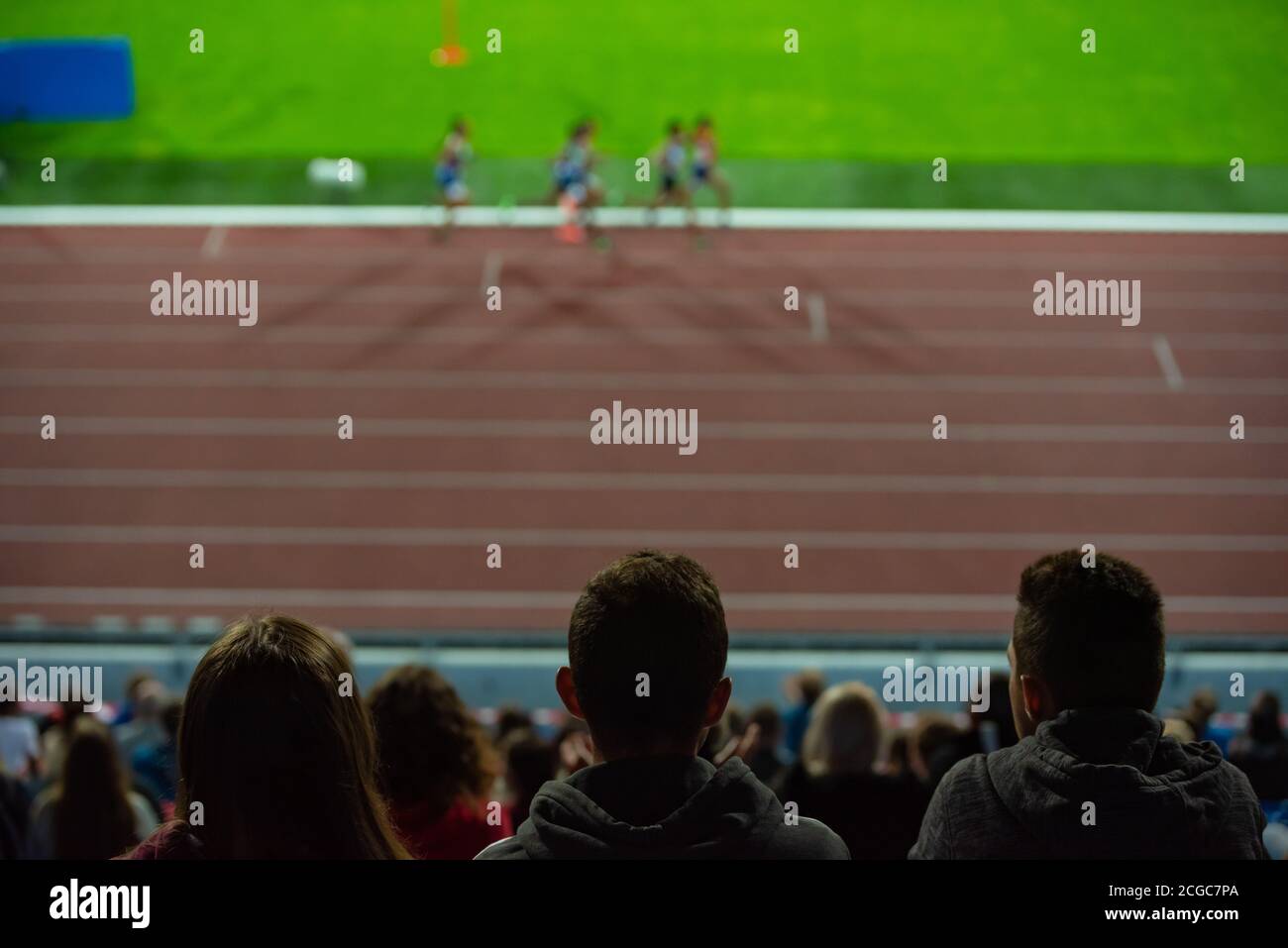 Fans support athletes on professional athletics race Stock Photo - Alamy