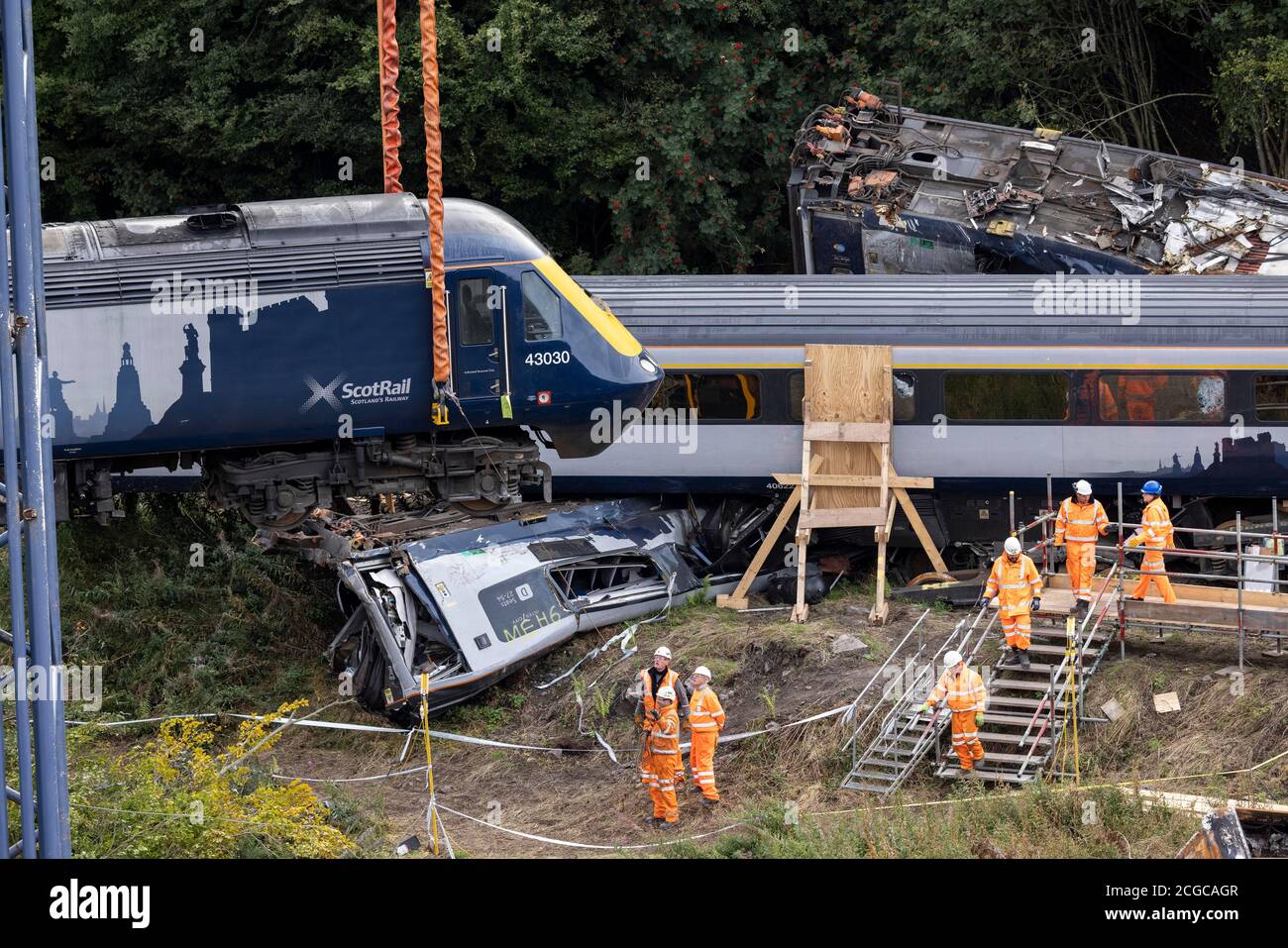 A carriage is lifted by crane from the site of the Stonehaven rail ...