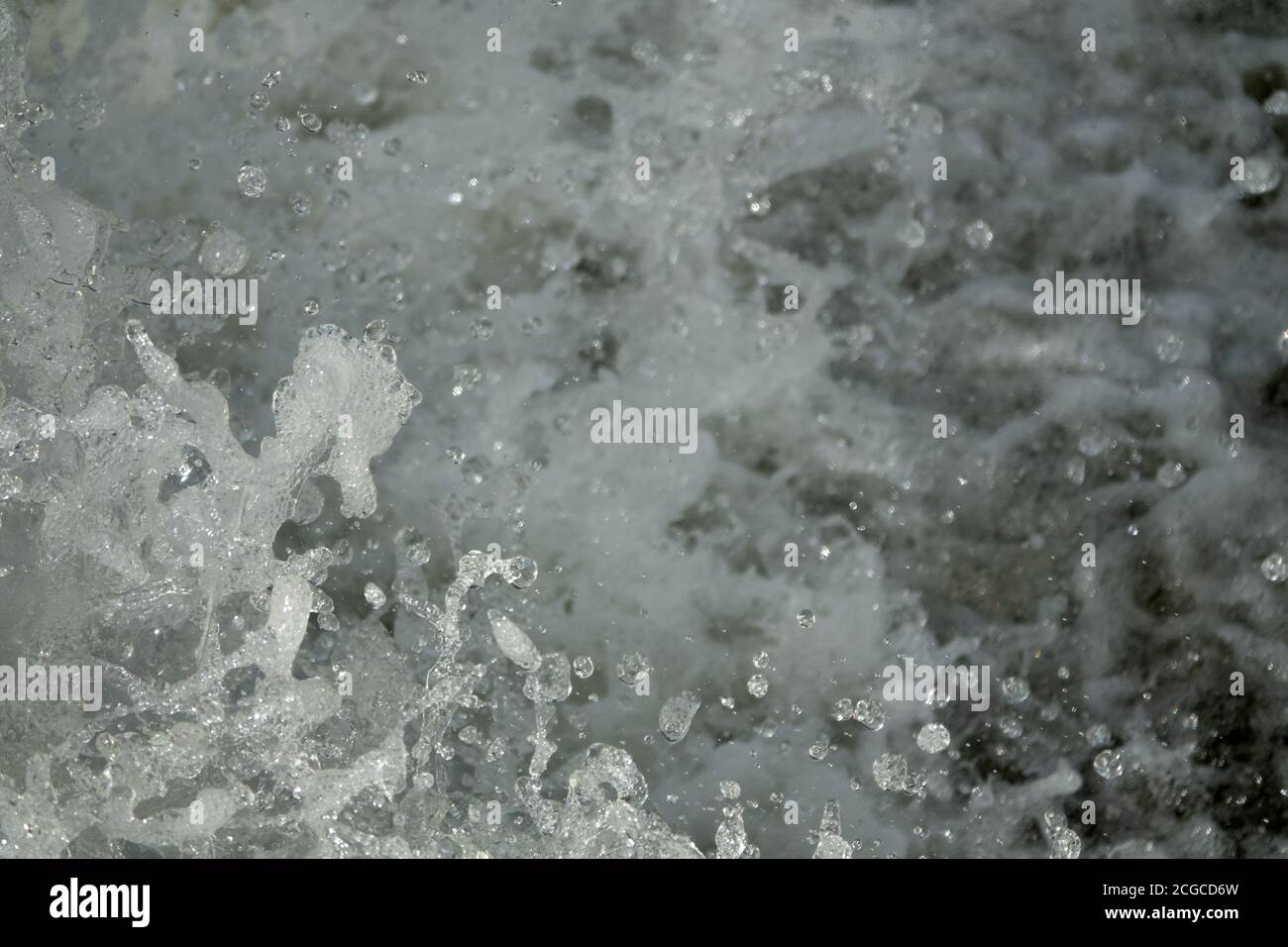 Water splashes from waterfall close-up. Beauty of clear spring water ...