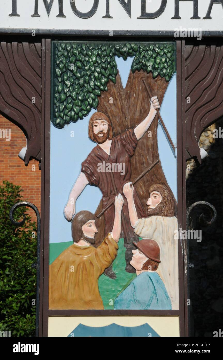 Town sign, Wymondham, Norfolk. One side depicts Robert Kett, and a wood ...
