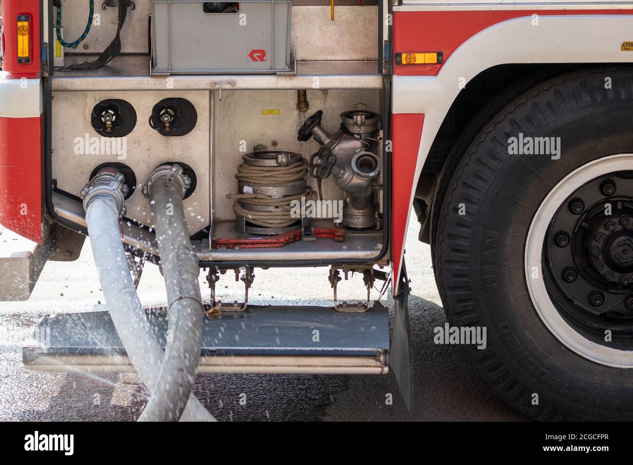 Red fire pumps department hi-res stock photography and images - Alamy