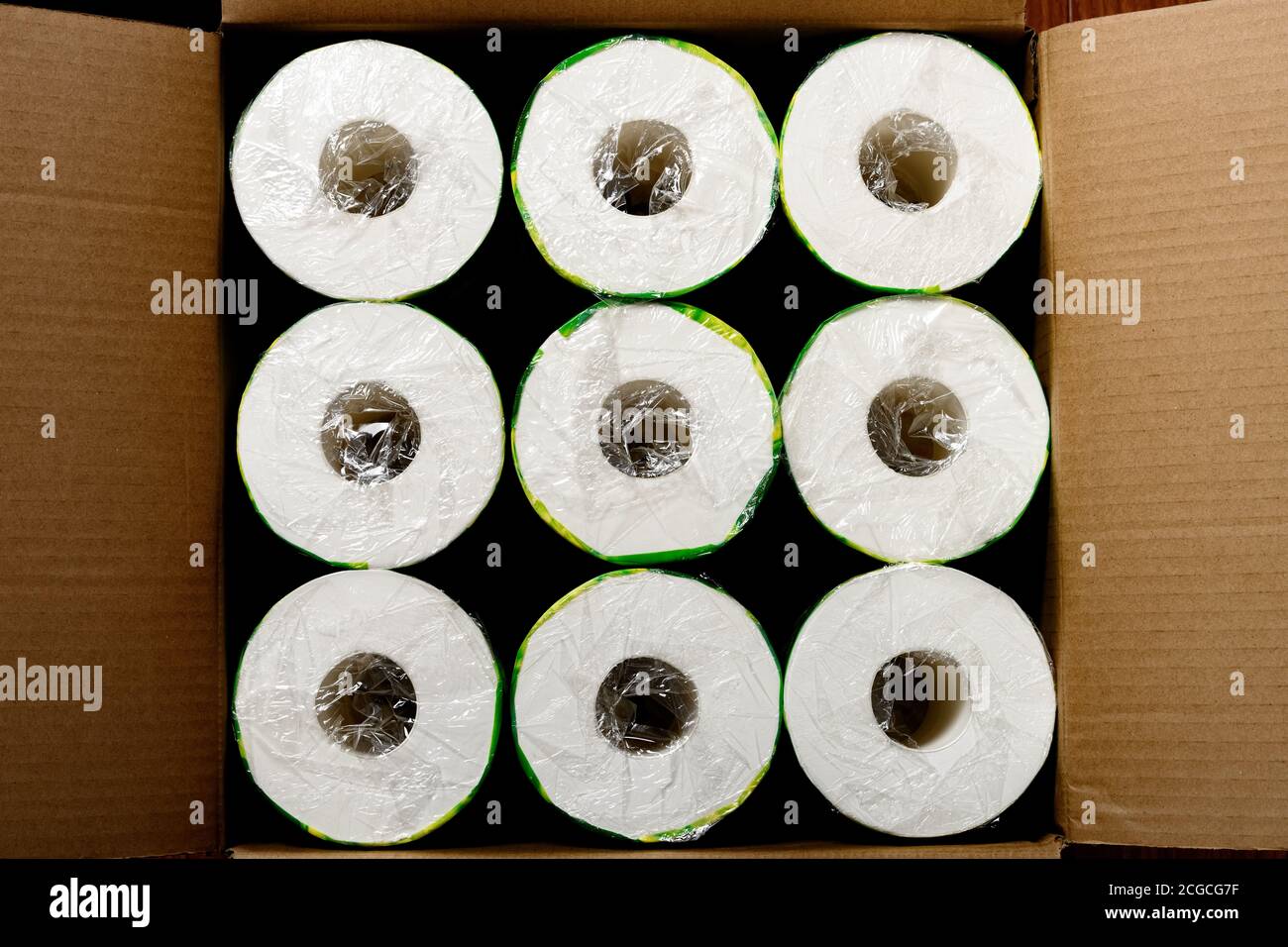 box of brand new paper rolls Stock Photo - Alamy