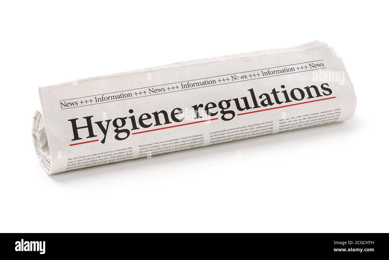 Rolled newspaper with the headline Hygiene regulations Stock Photo - Alamy