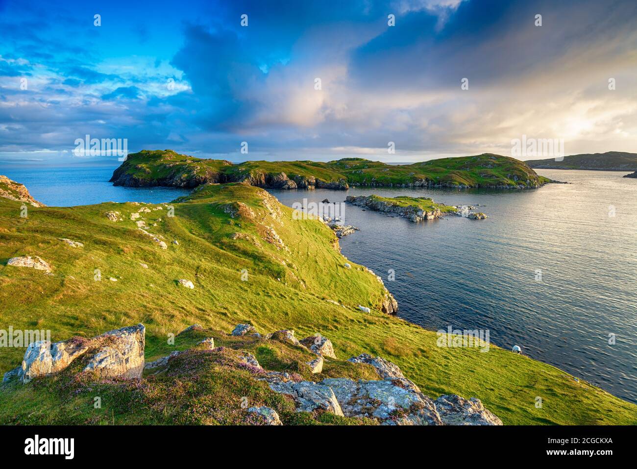 Sunny evening over the coastline at Rodel on the Isle of Harris in the ...
