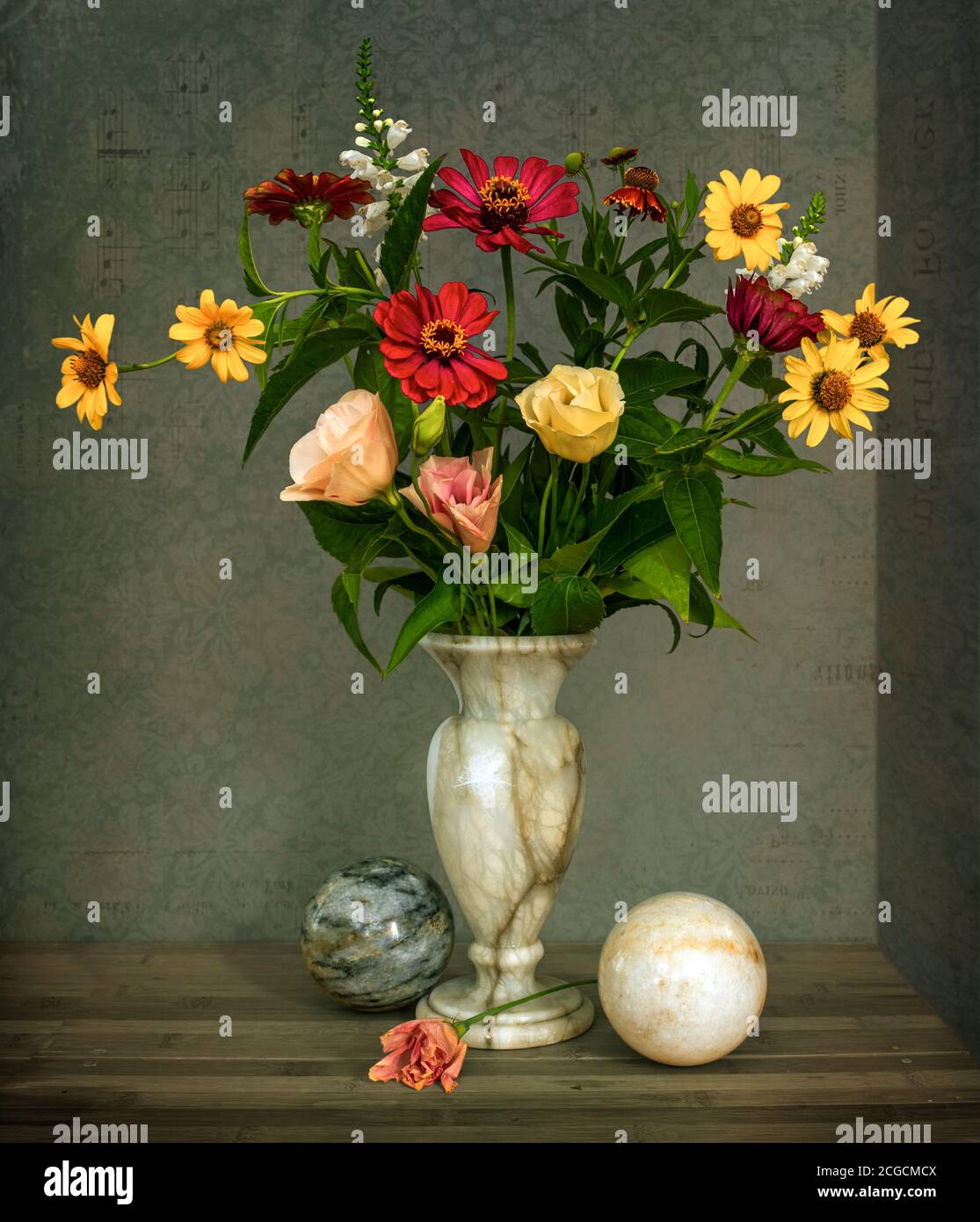 Still life with flowers balloons. A small bouquet of different flowers ...