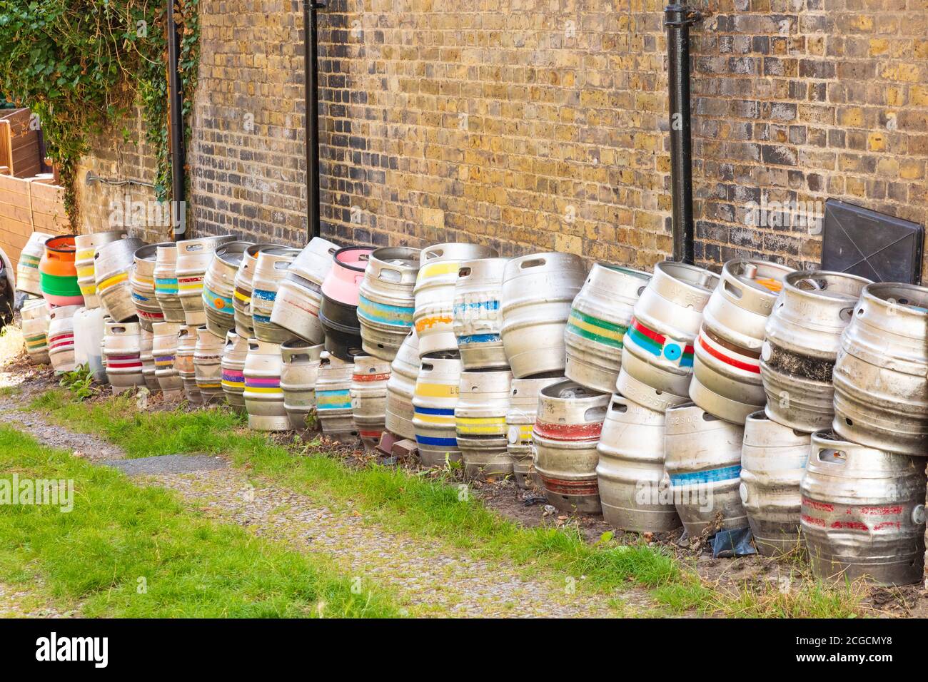 Colourful beer barrels outside the Kings Arms on Upnor High Street ...