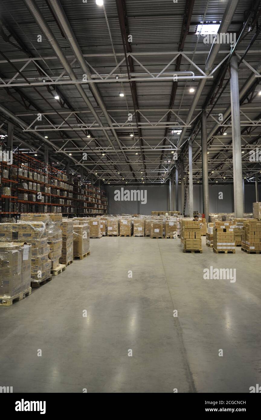 Warehouse inside with lots of boxes Stock Photo - Alamy