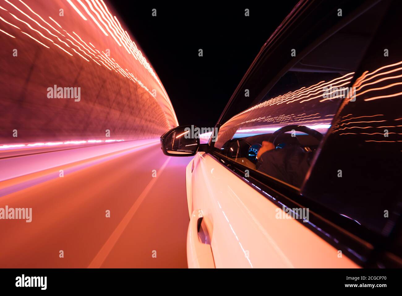 POV of car driving at night city with motion blur effect ...