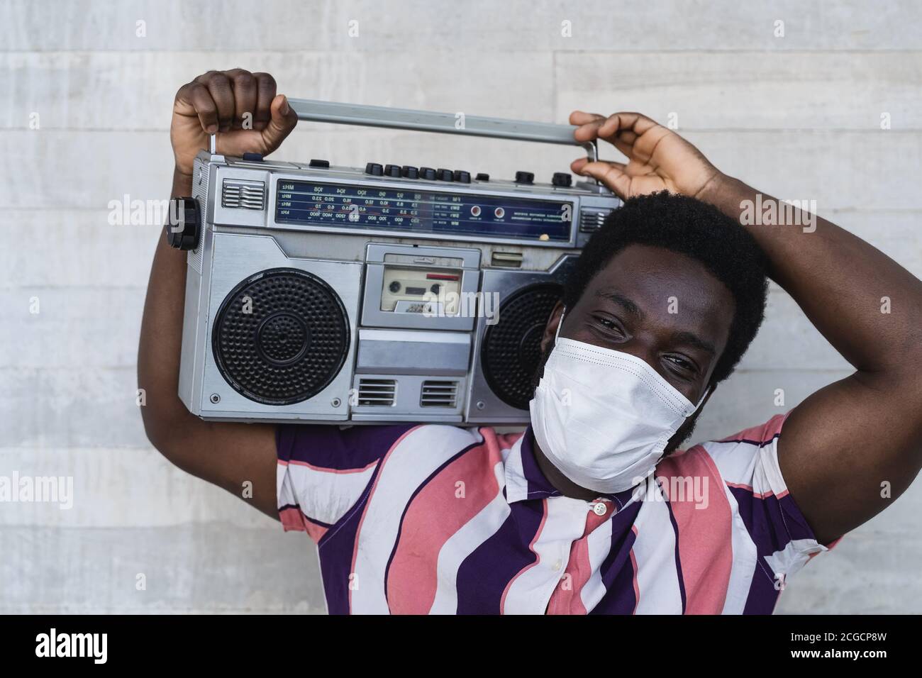 Young man listening cassette player hi-res stock photography and images ...