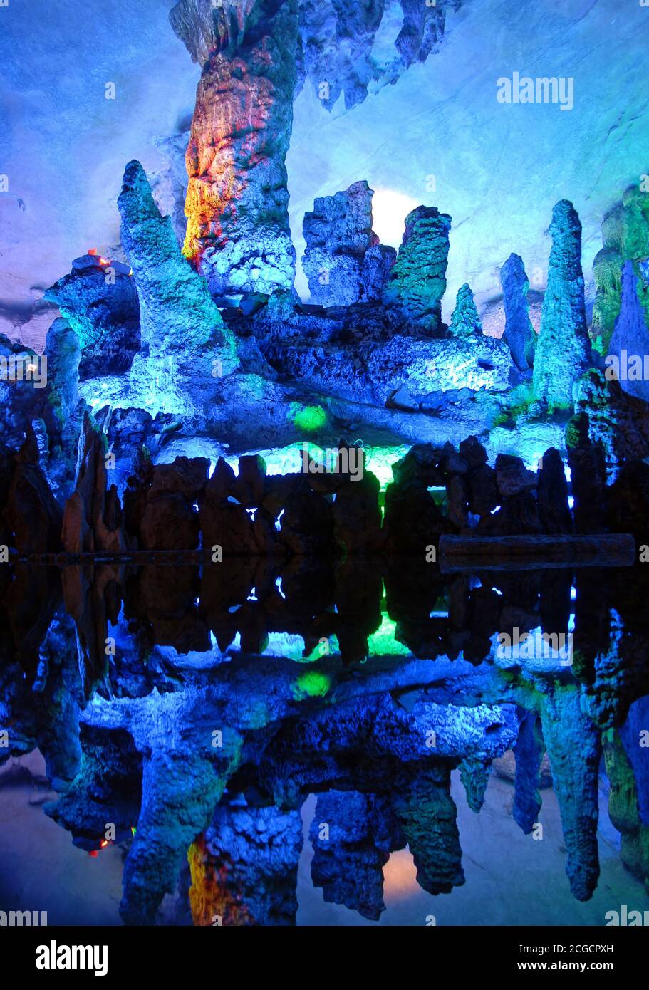 Colorful illuminated stalagmites and stalactites of Seven Star Cave in ...