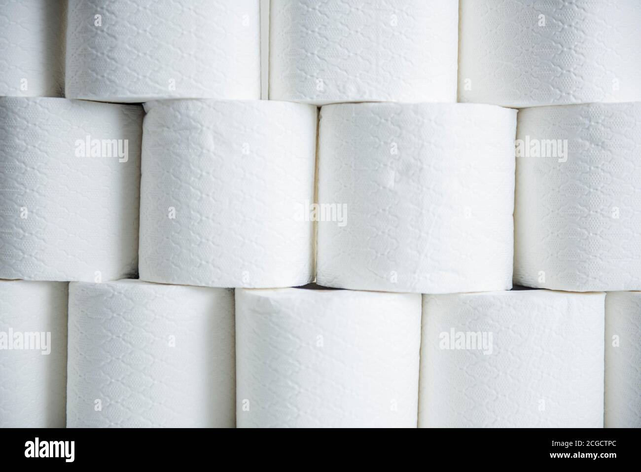 Stacked rolls of toilet paper Stock Photo - Alamy