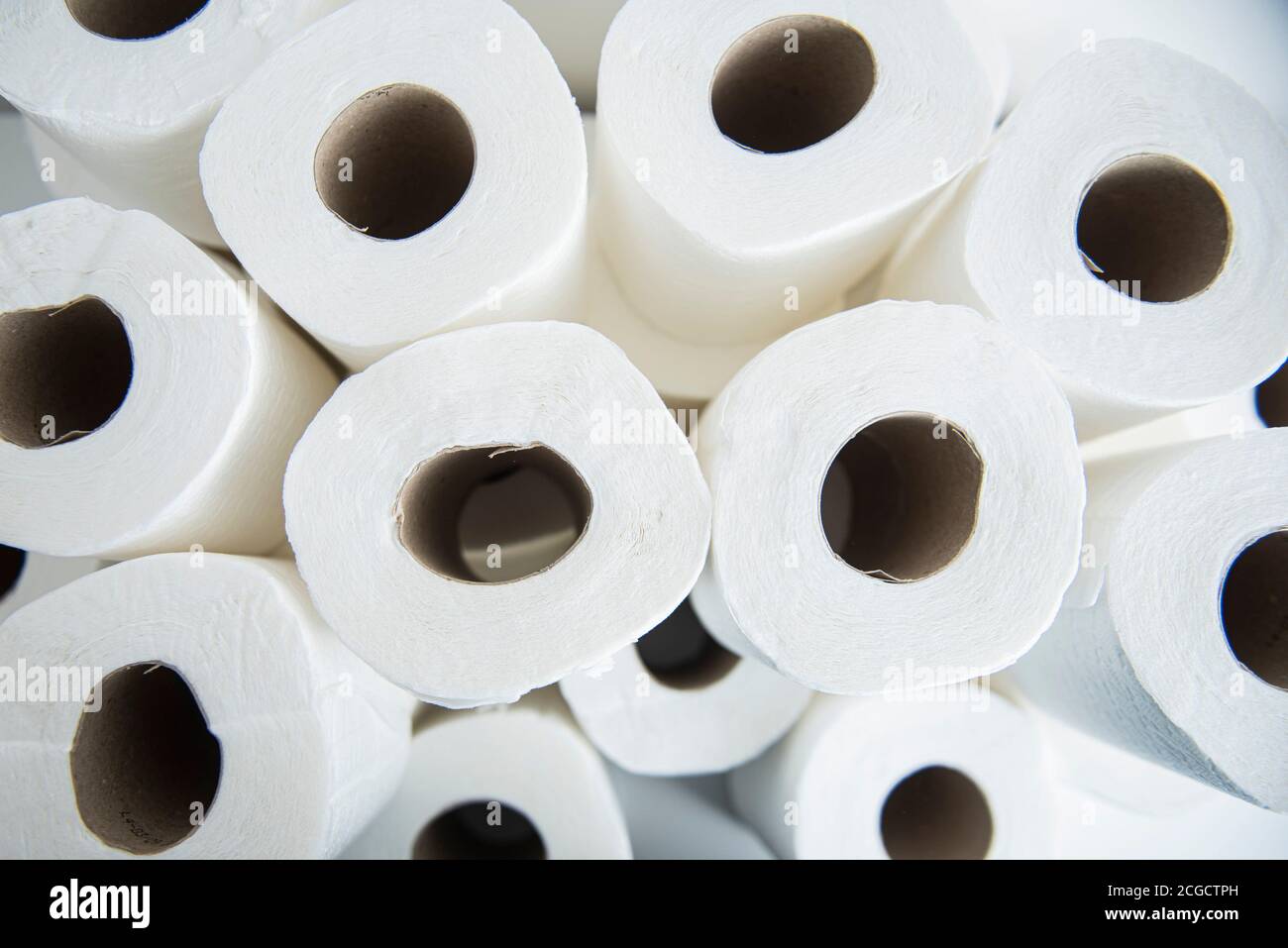 Stacked rolls of toilet paper Stock Photo - Alamy