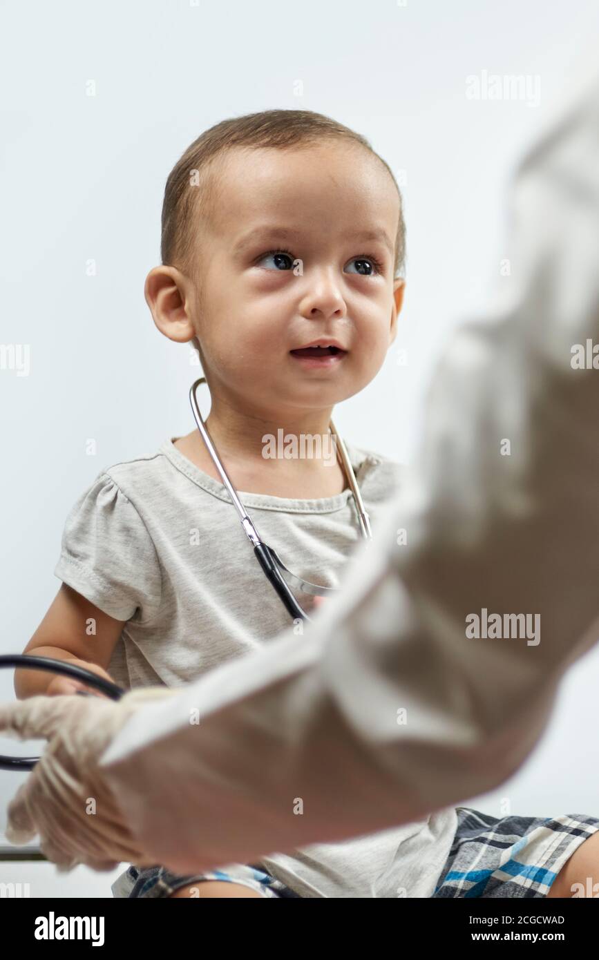 Physical examination of the 1 year old baby boy. Well-baby exam ... Physical examination of the 1 year old baby boy. Well-baby exam ...