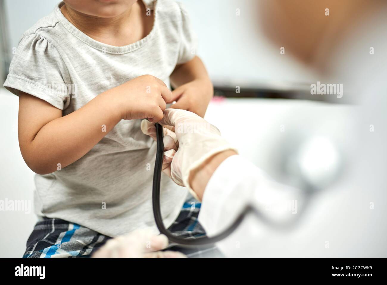 Doctor trying to listen to baby heartbeat. Physical examination of the ...