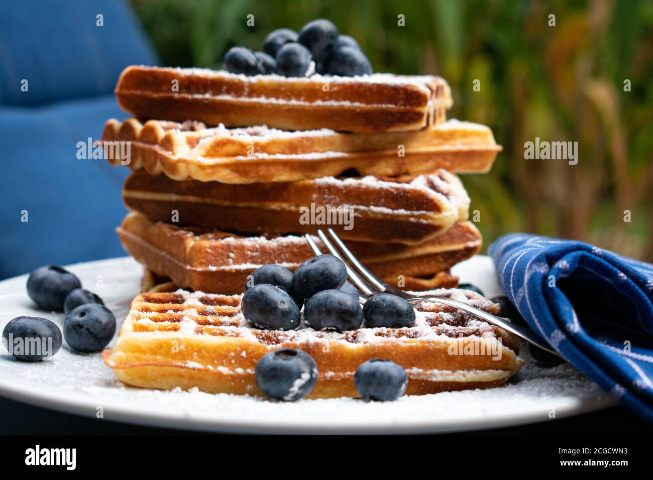 Waffle stack with fresh and homemade belgian waffles Stock Photo - Alamy