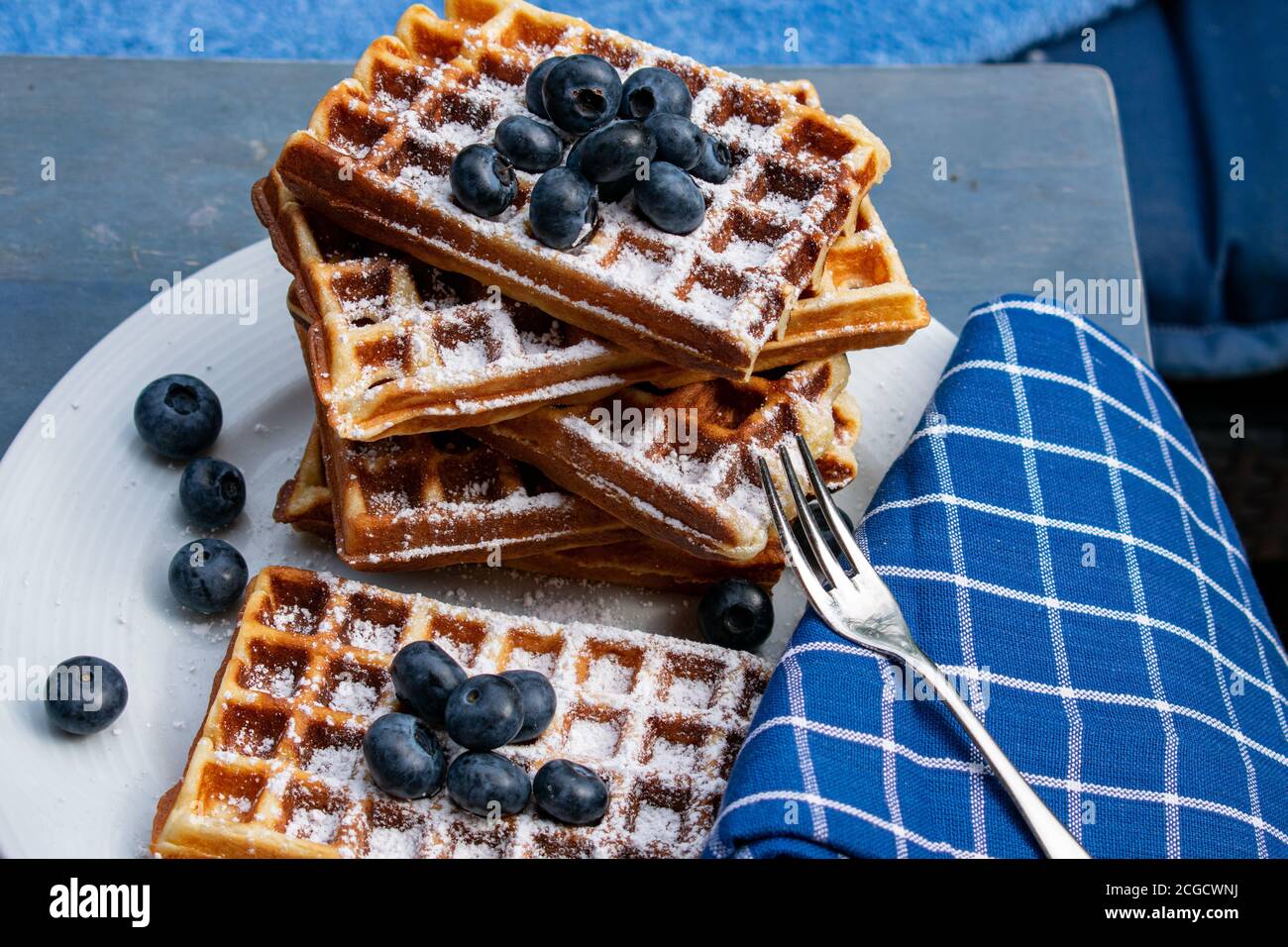 Waffle stack with fresh and homemade belgian waffles Stock Photo - Alamy