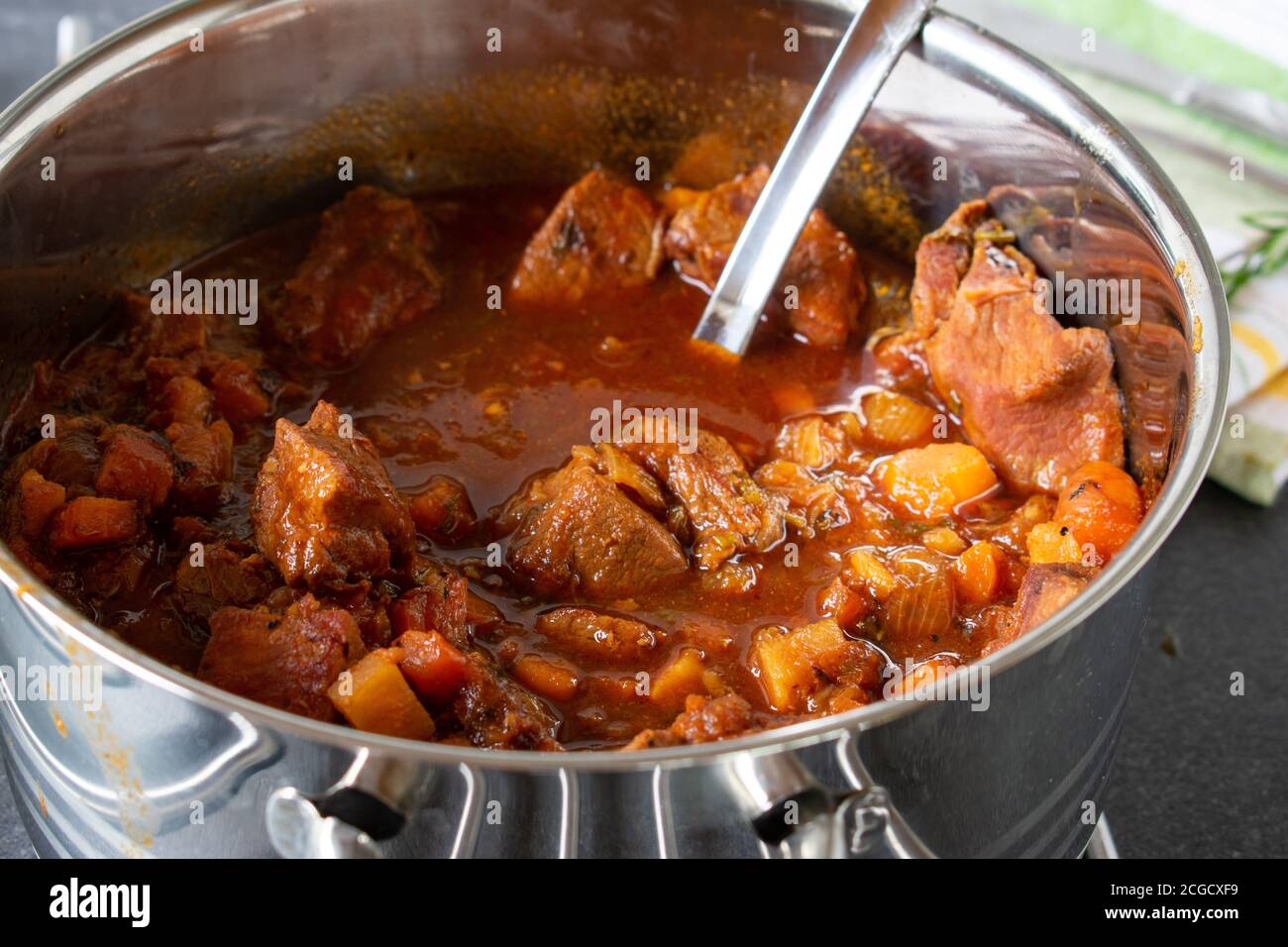 braised italian stew with pork and vegetables in a pot Stock Photo - Alamy
