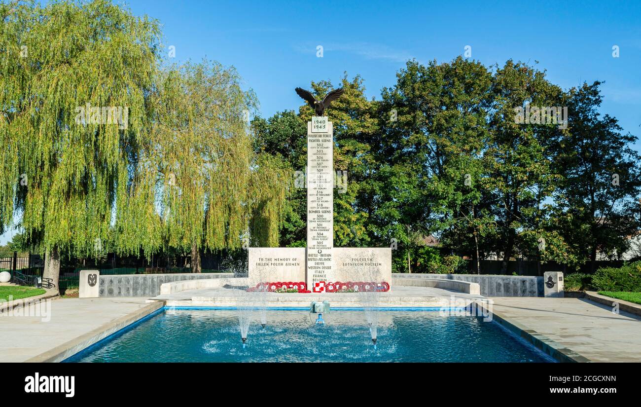 Inside the Polish War Memorial on a sunny day with fountain and poppies ...