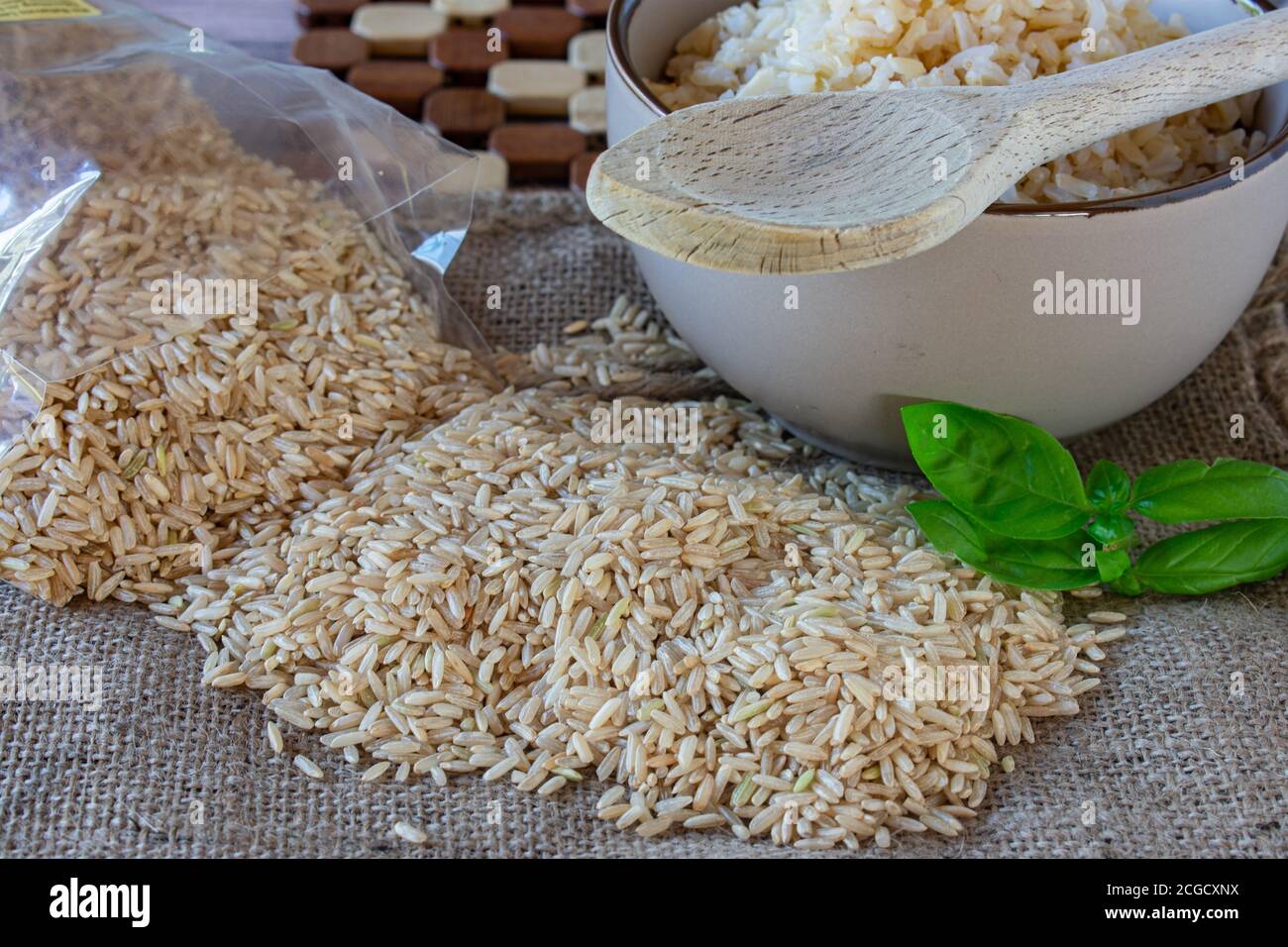 Raw and uncooked brown basmati rice on a jute cloth Stock Photo - Alamy