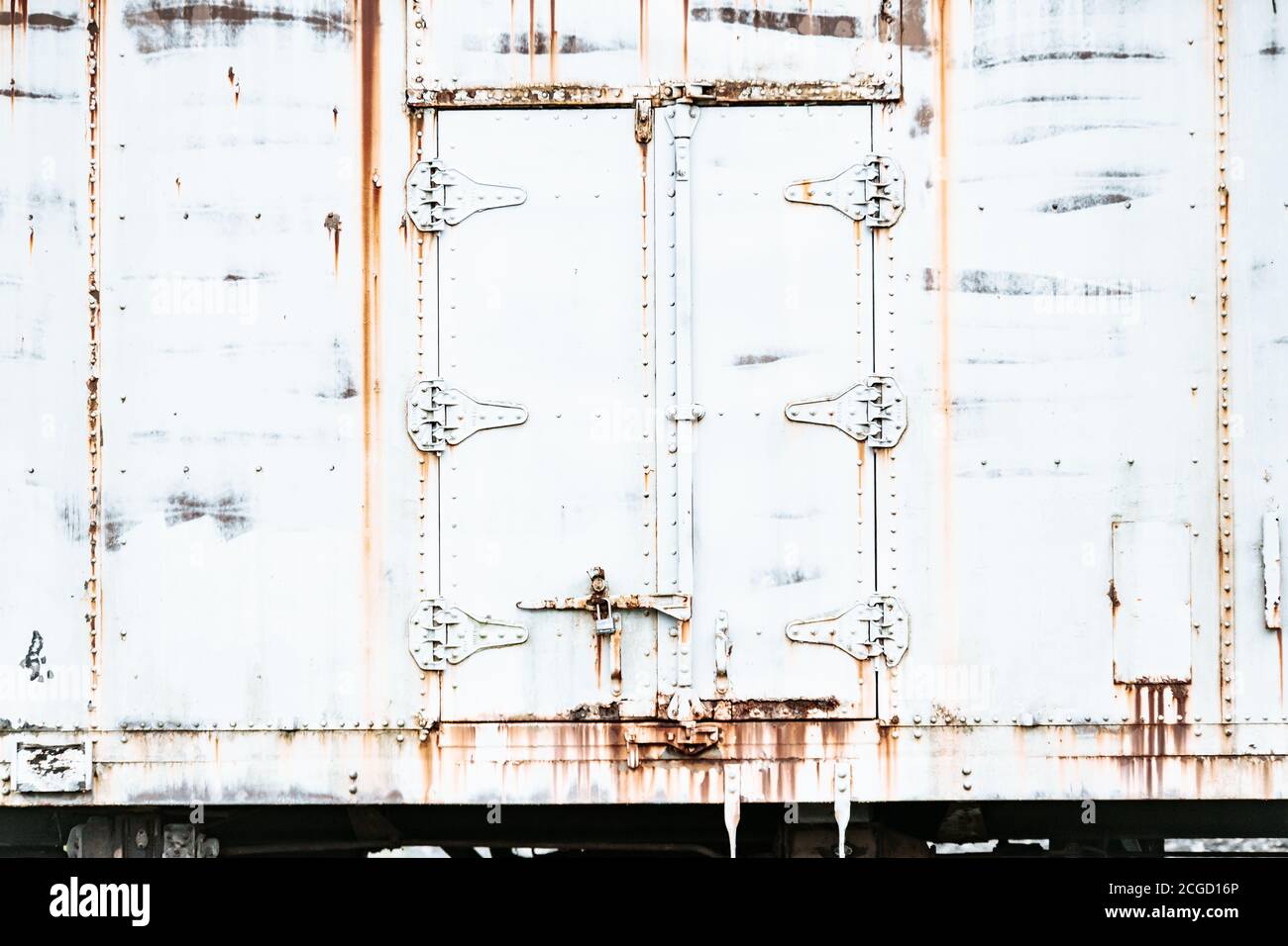 Old white rusty train box car Stock Photo - Alamy