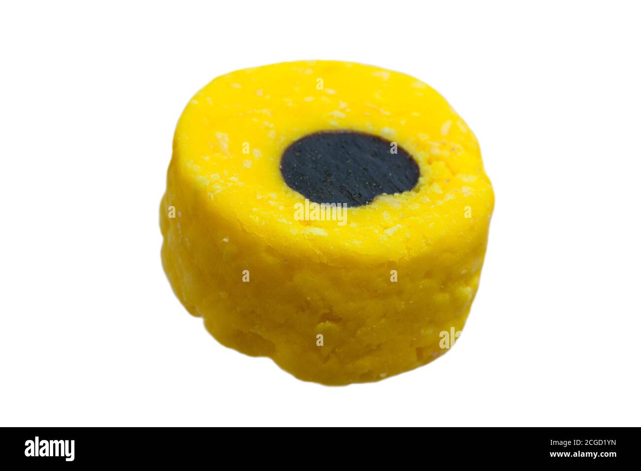 Single Liquorice Allsort from box of M&S Liquorice Allsorts isolated on ...