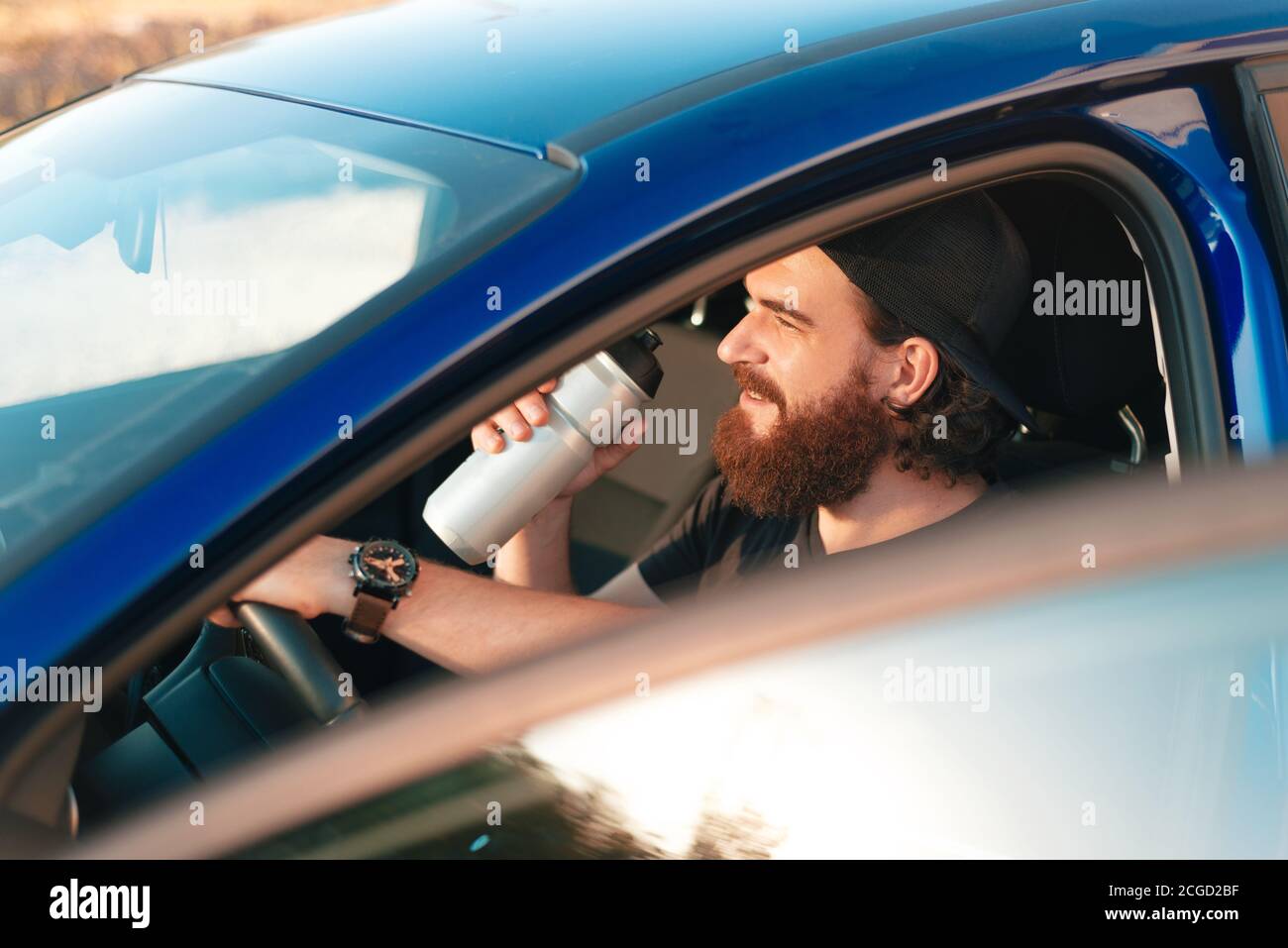 Driver drinking from water bottle hi-res stock photography and images ...