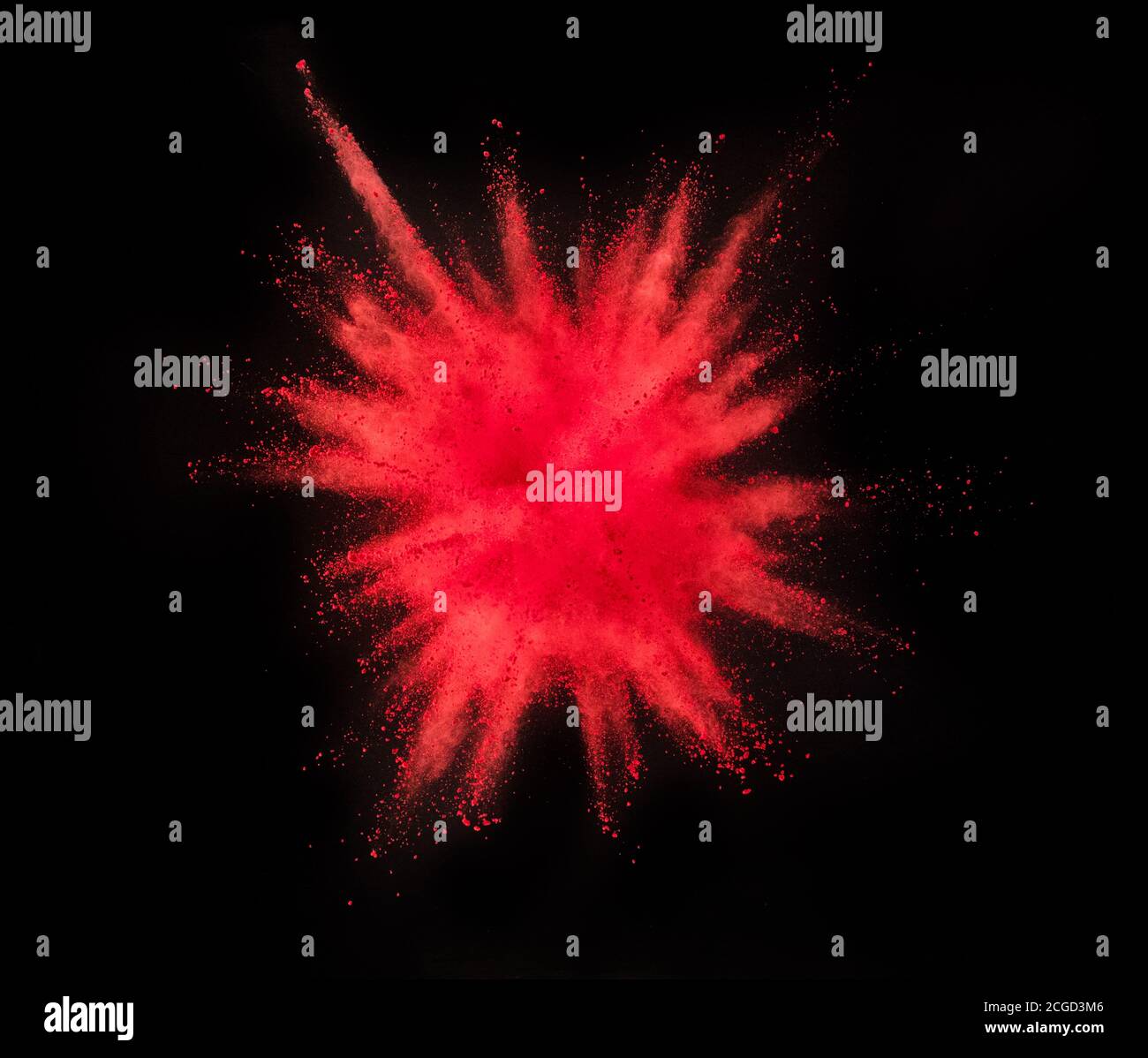 Explosion of red powder isolated on black background. Abstract colored ...