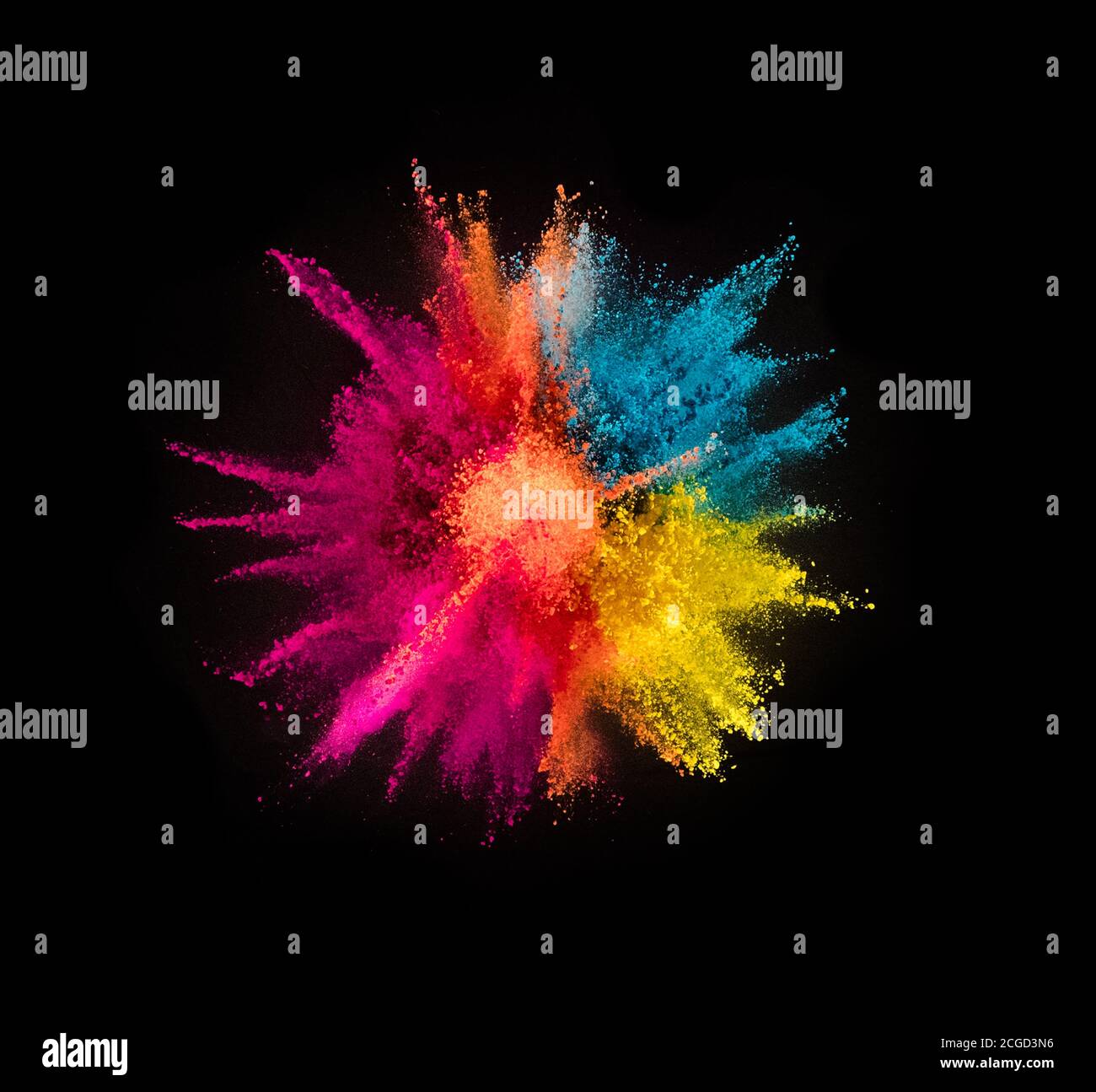 Colored powder explosion isolated on black background Stock Photo - Alamy
