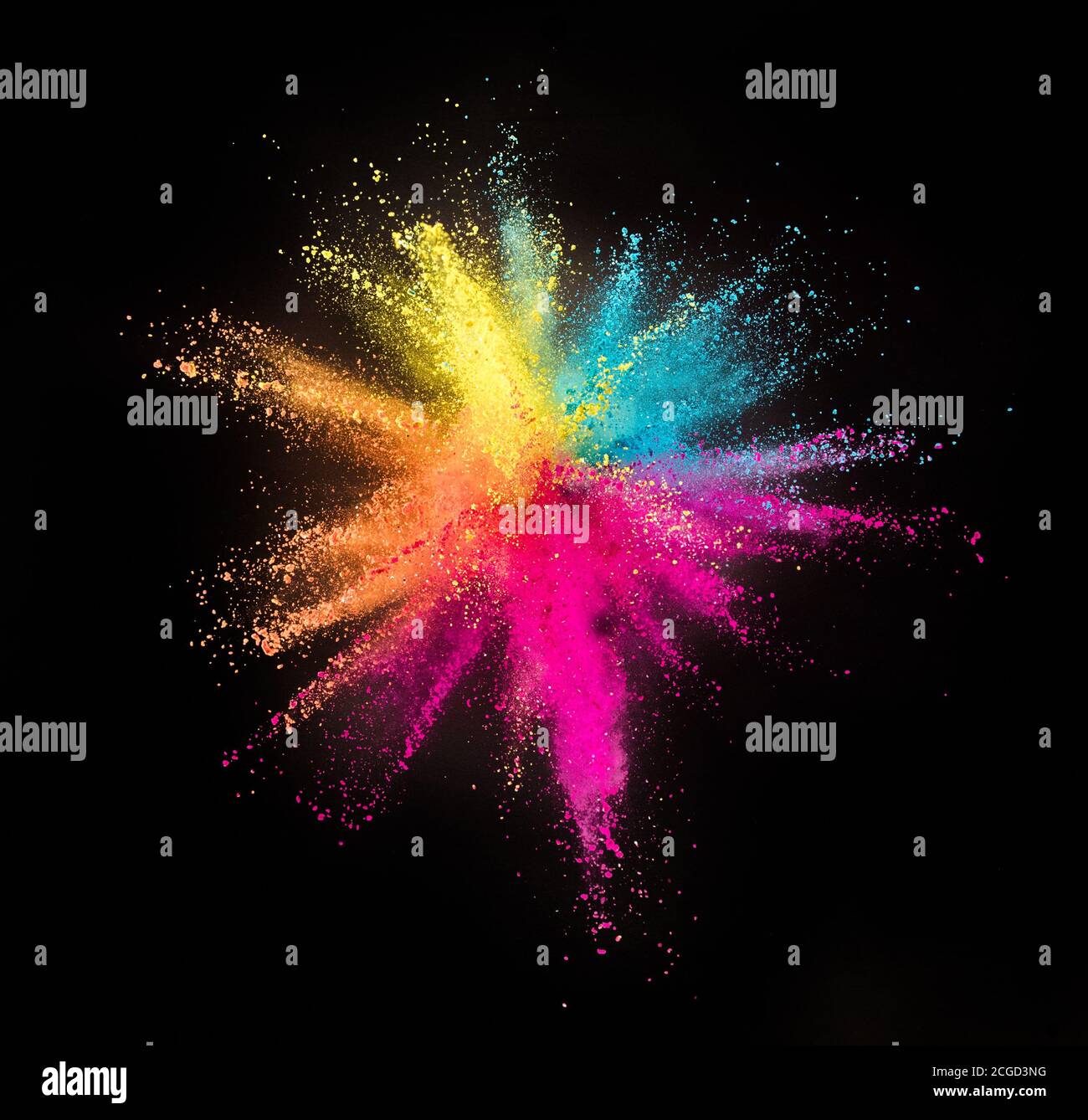Colored powder explosion isolated on black background Stock Photo - Alamy